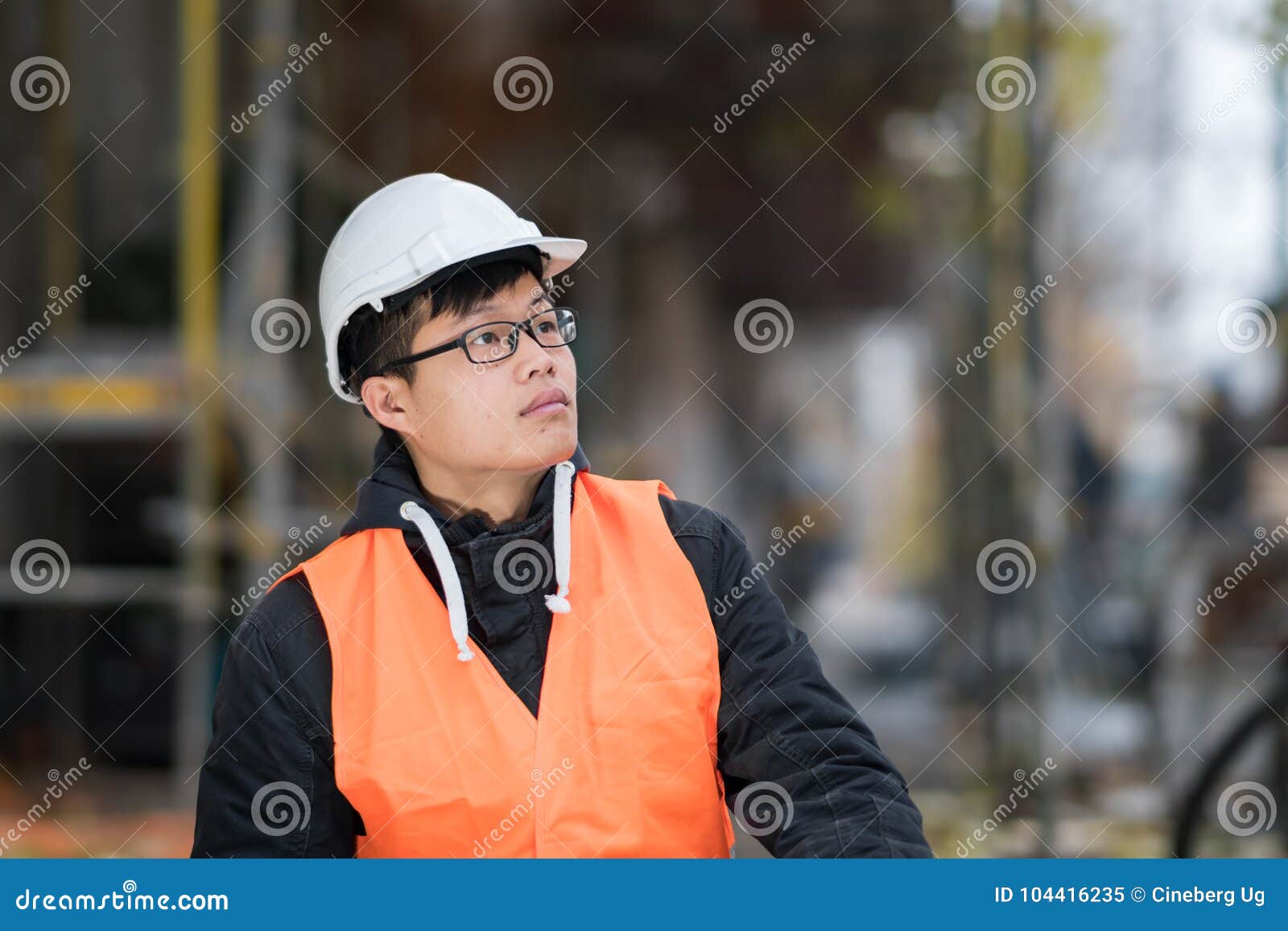 Young Asian Engineer at Work on Construction Site Stock Image - Image ...