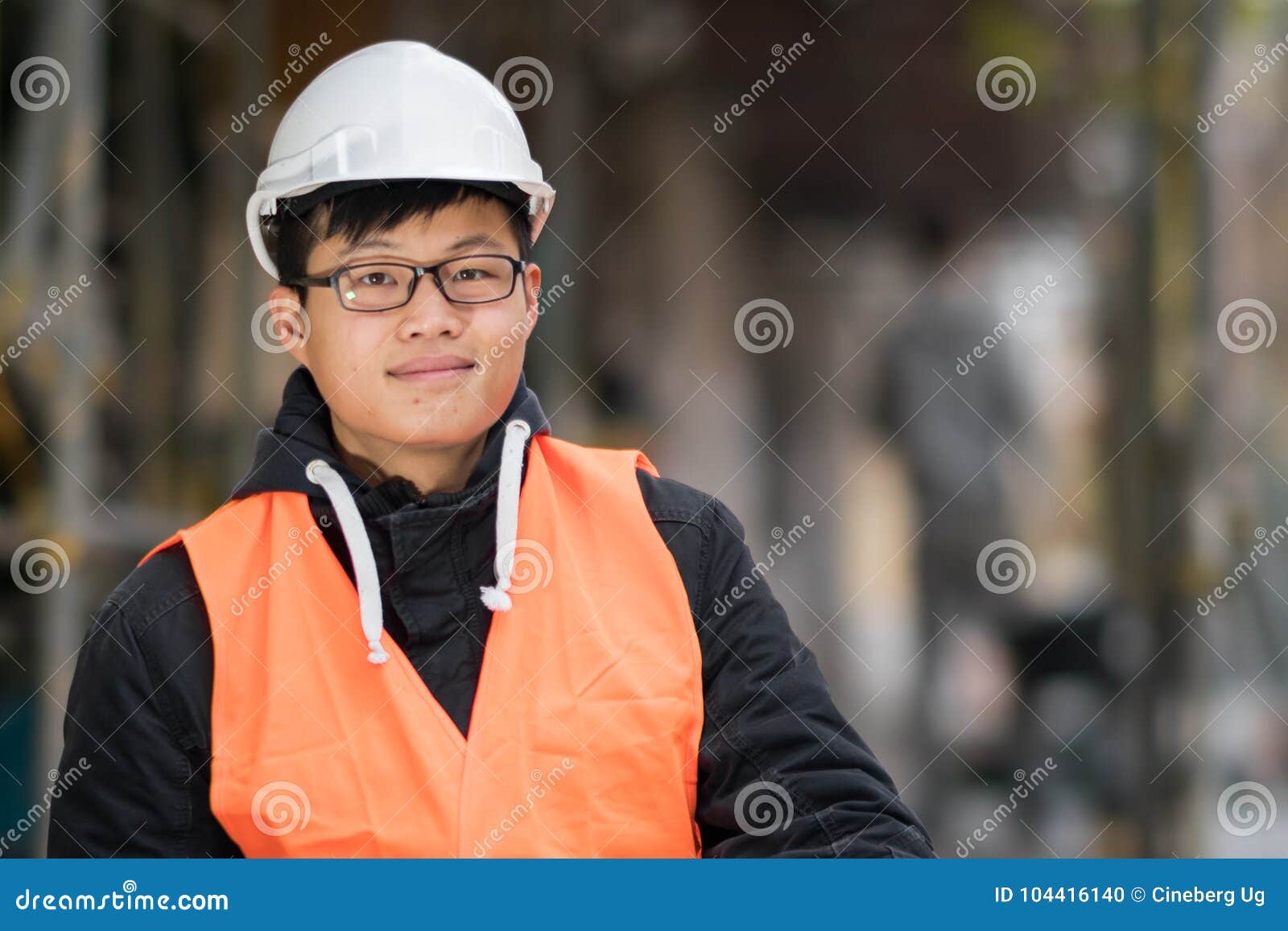 Young Asian Engineer Smiling on Construction Site Stock Photo - Image ...