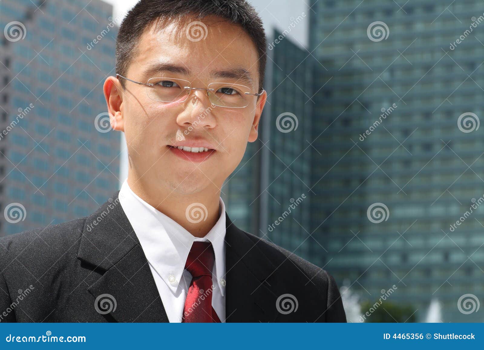 Young Asian Executive in Front of Office Buildings Stock Photo - Image ...
