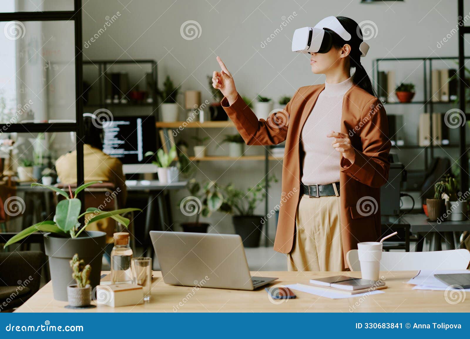 Young Woman Using VR Headset at Work Stock Image - Image of plant ...