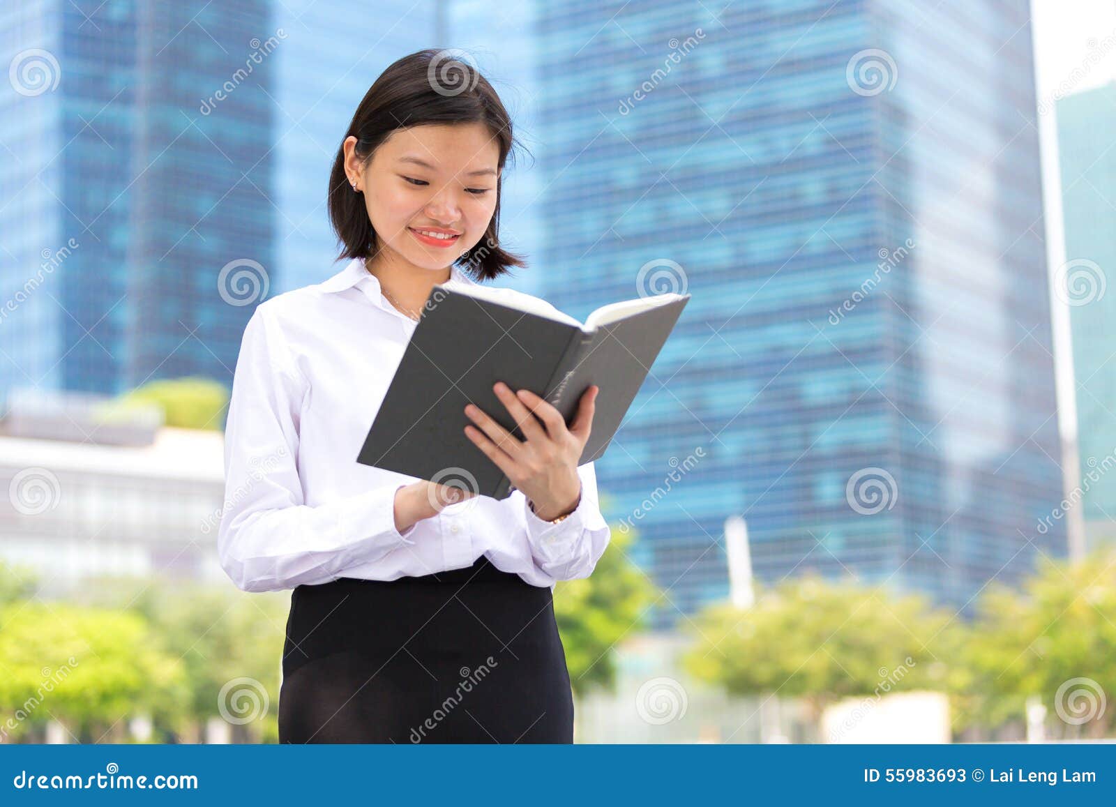 Young Asian Female Executive Reading Book Stock Image - Image of ...