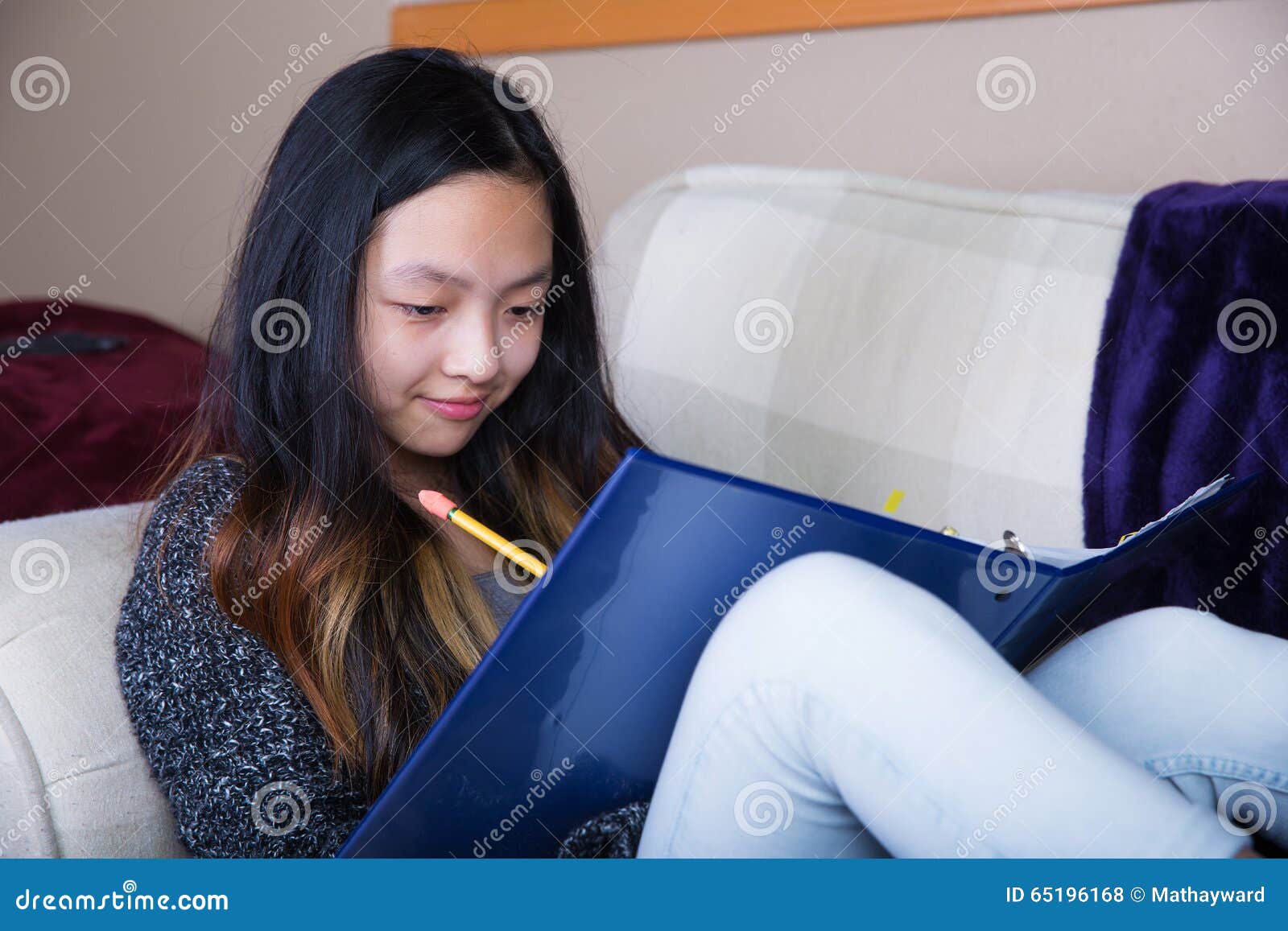 Young Asian Girl Doing Homework Stock Photo - Image of culture, girl ...