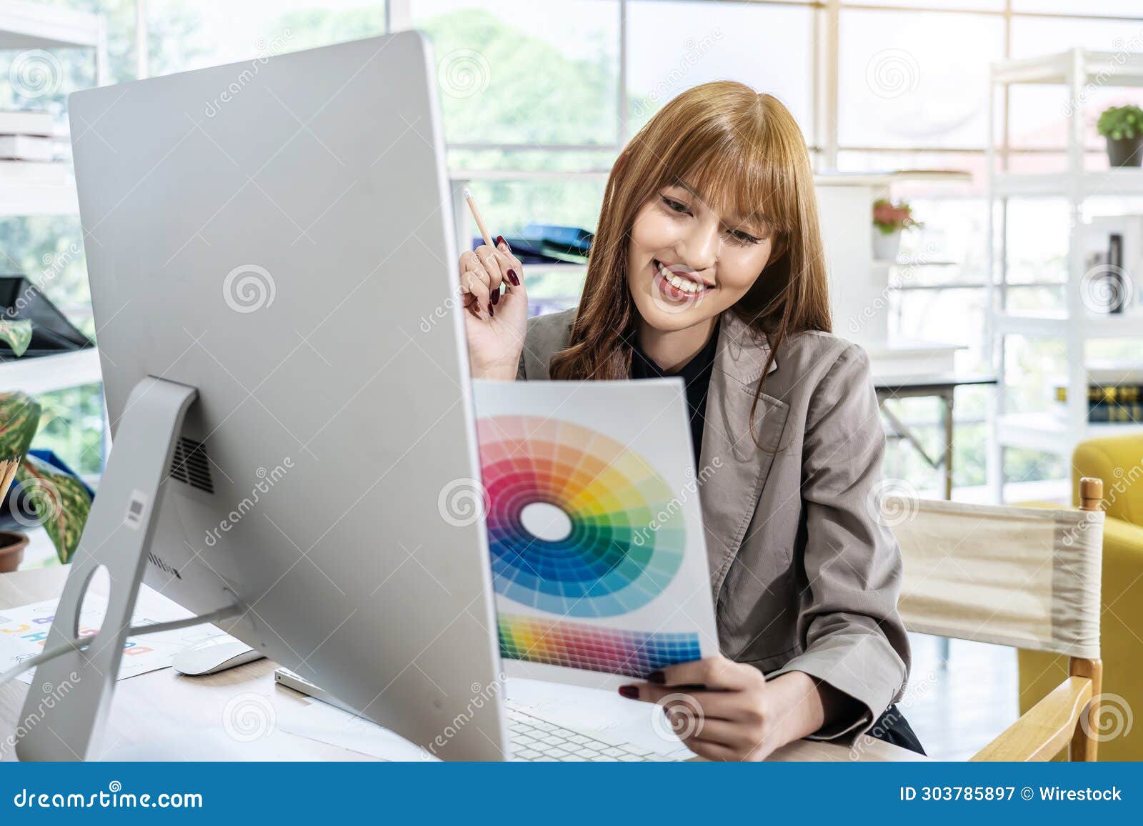 Young Asian Graphic Designer Woman Working in a Creative Dynamic Office ...