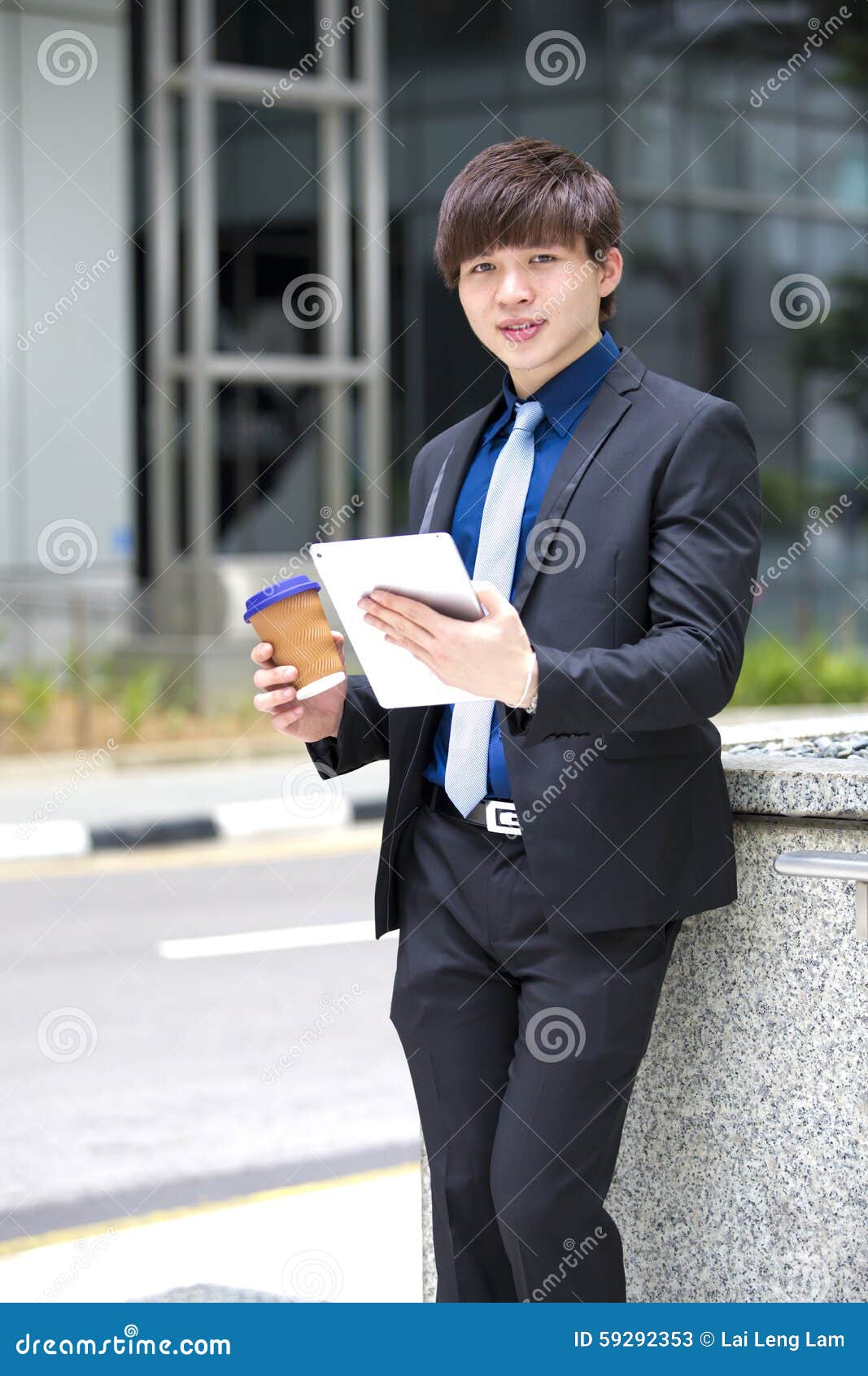 Young Asian Male Business Executive Using Tablet PC Stock Image - Image ...