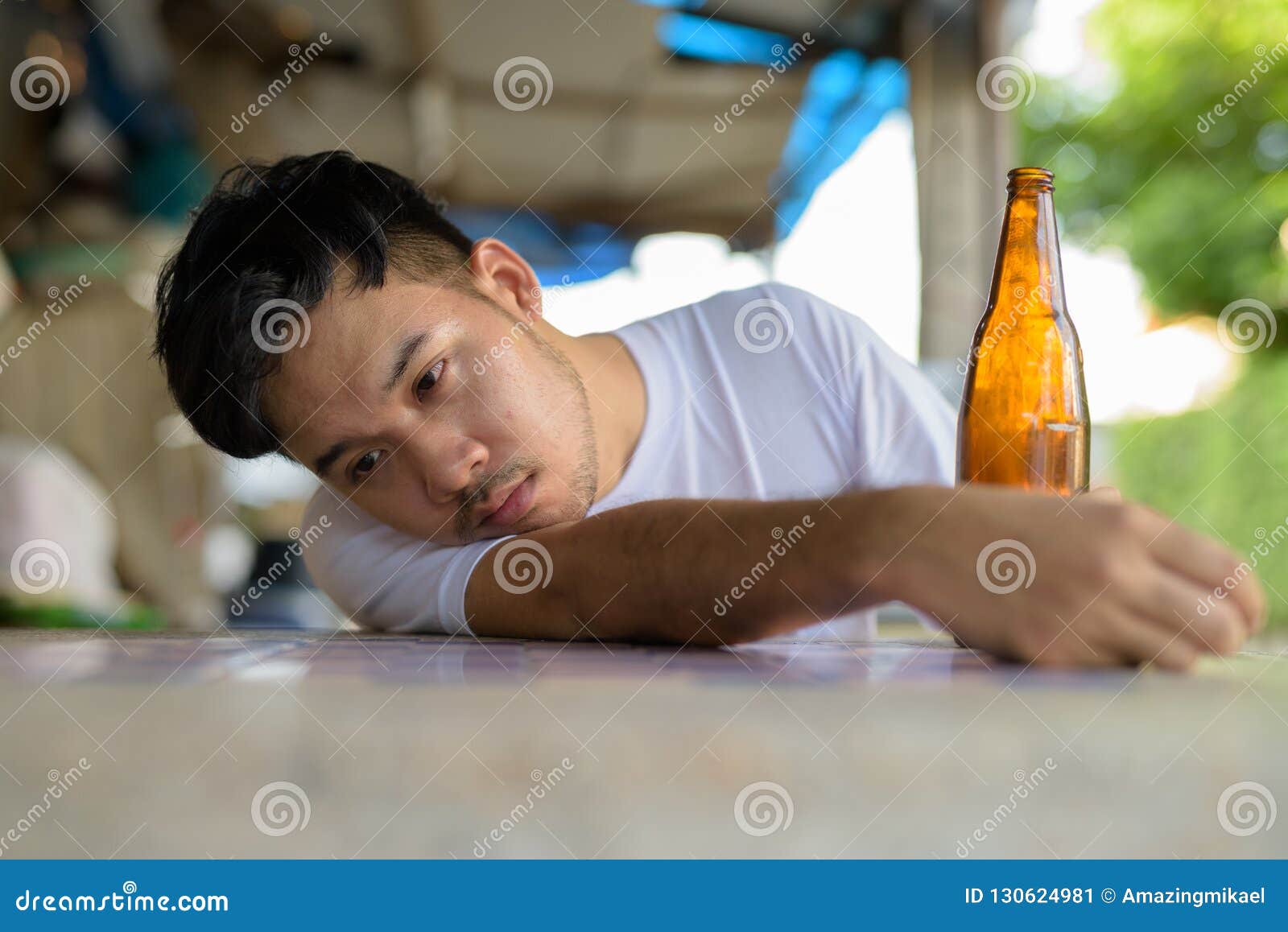 Young Asian Man Getting Drunk in the Streets Outdoors Stock Image ...