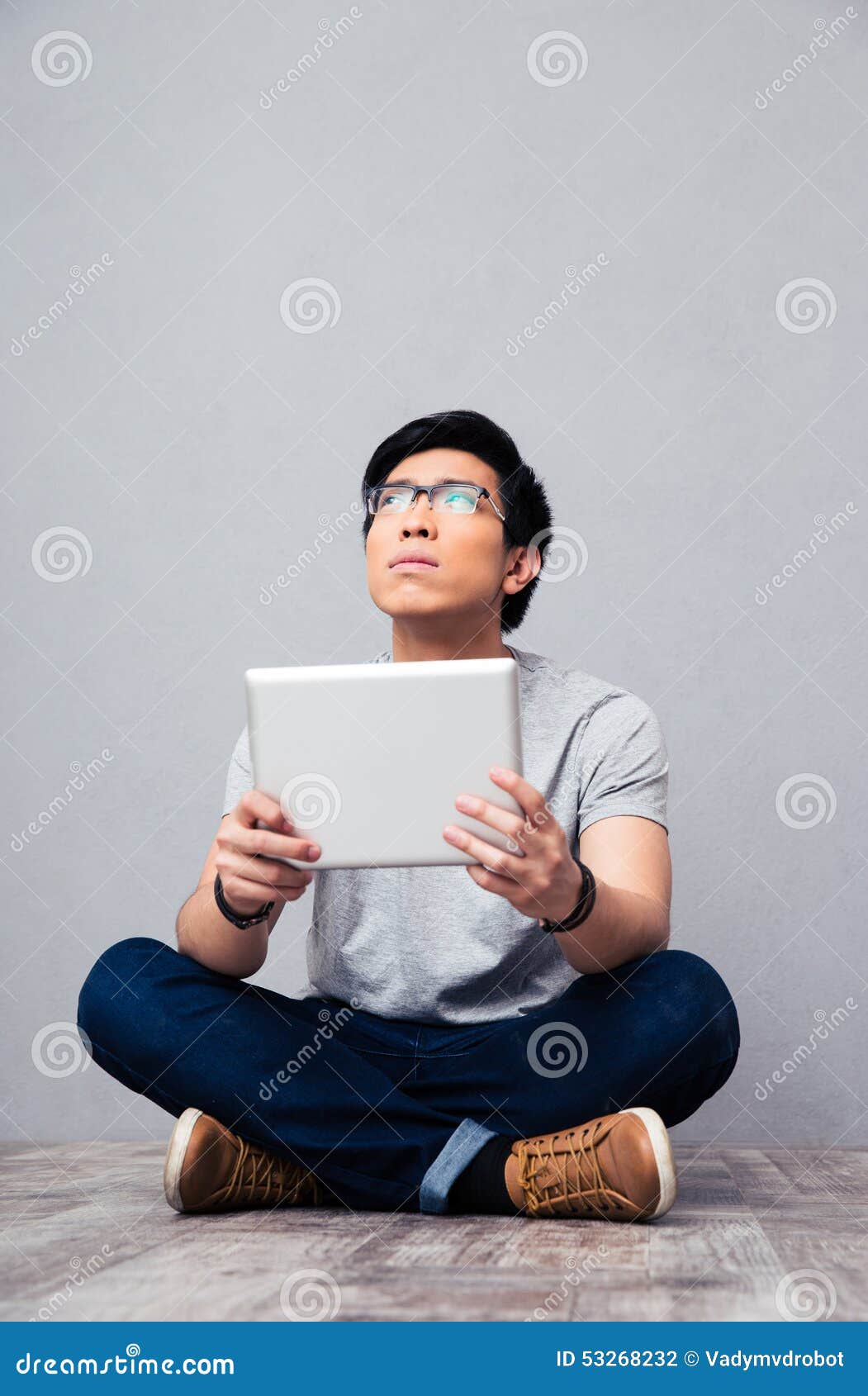 Young Asian Man Holding Tablet Computer Stock Photo - Image of ...