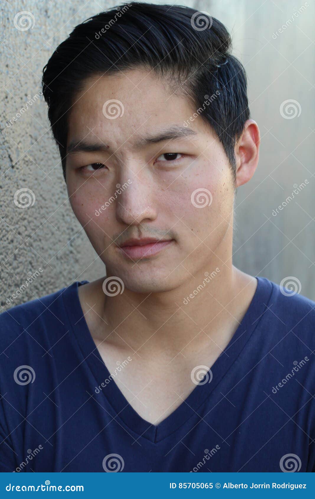 Young Asian Man Looking at the Camera - Stock Image Stock Image - Image ...