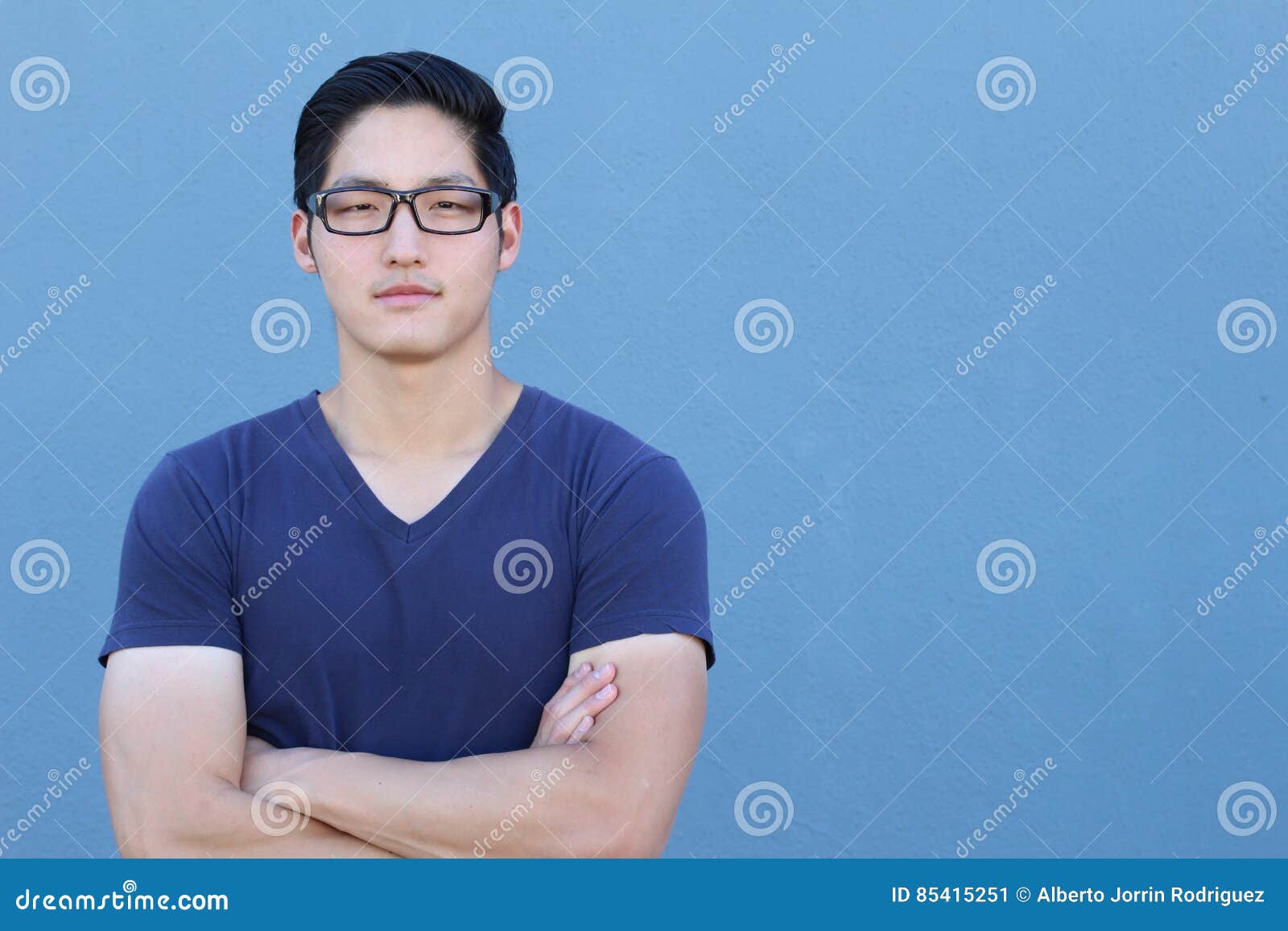 Young Asian Man Looking at the Camera - Stock Image with Copy Space ...
