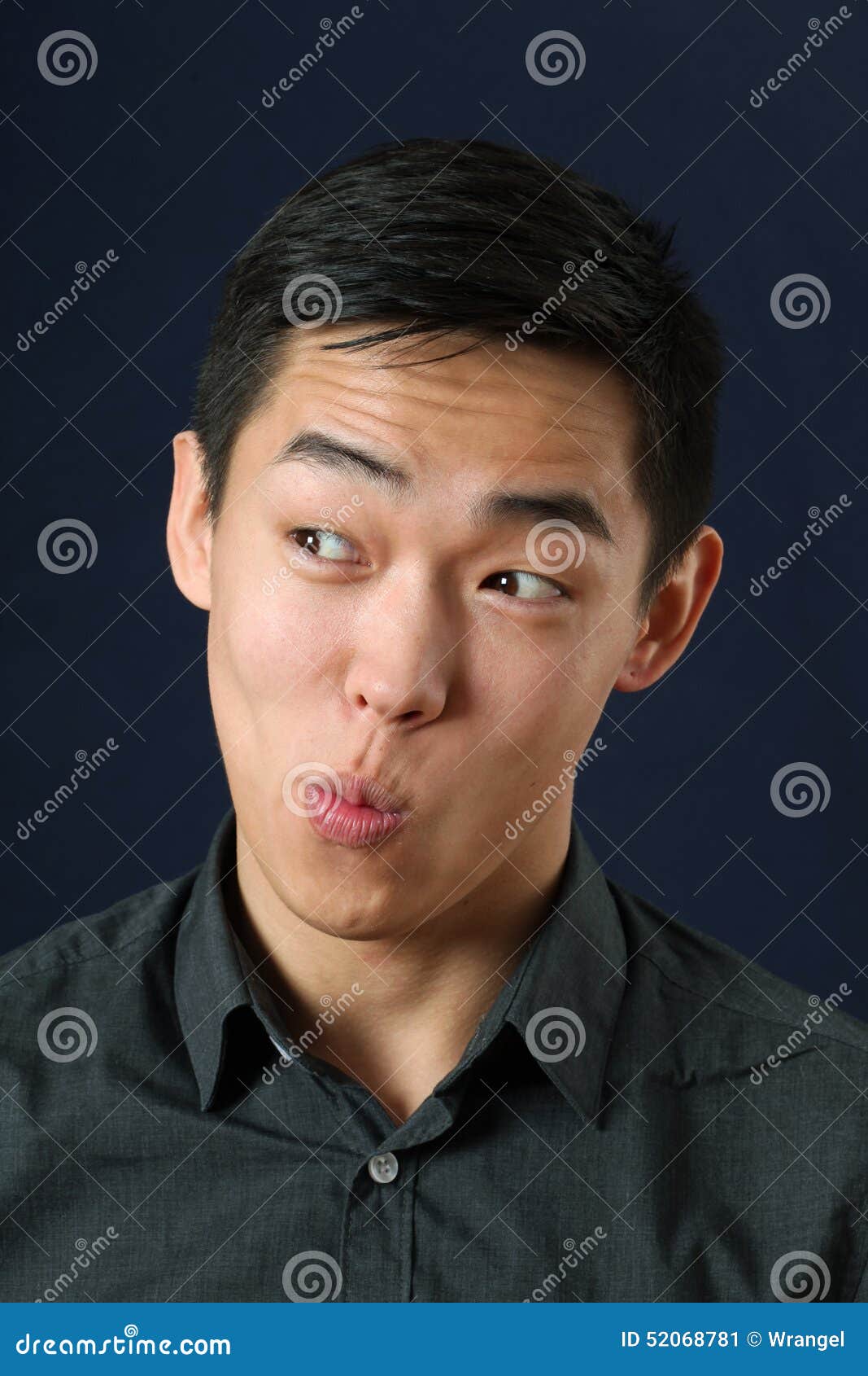 Young Asian Man Making Face Stock Image - Image of grimacing, pleased ...