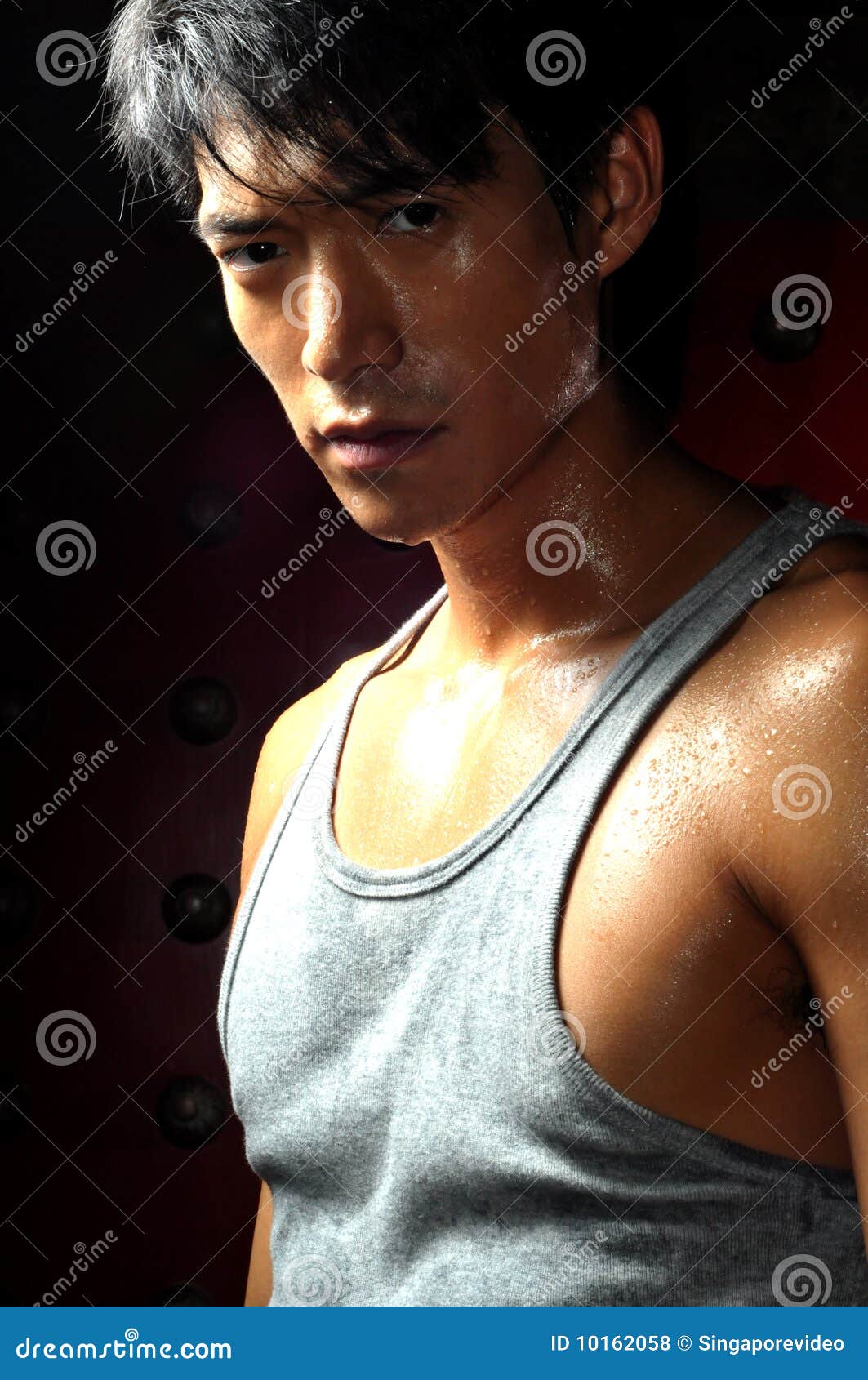 Young Asian Man Perspiring stock photo. Image of perspire - 10162058