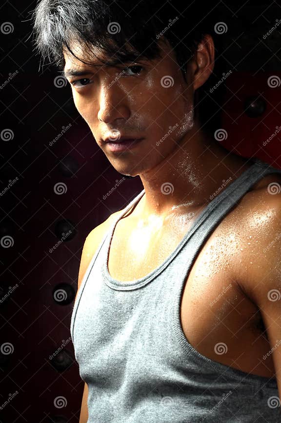 Young Asian Man Perspiring stock photo. Image of perspire - 10162058