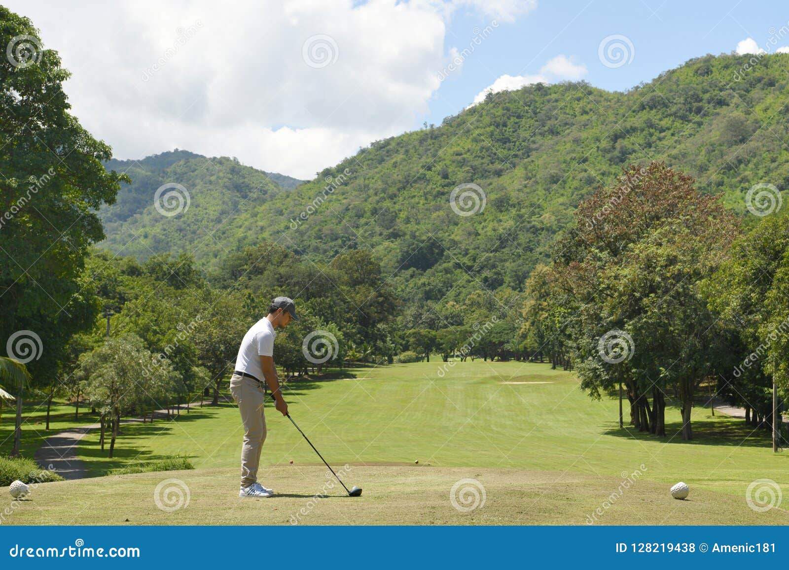 Asian Man Playing Golf on a Beautiful Natural Golf Course Stock Photo ...