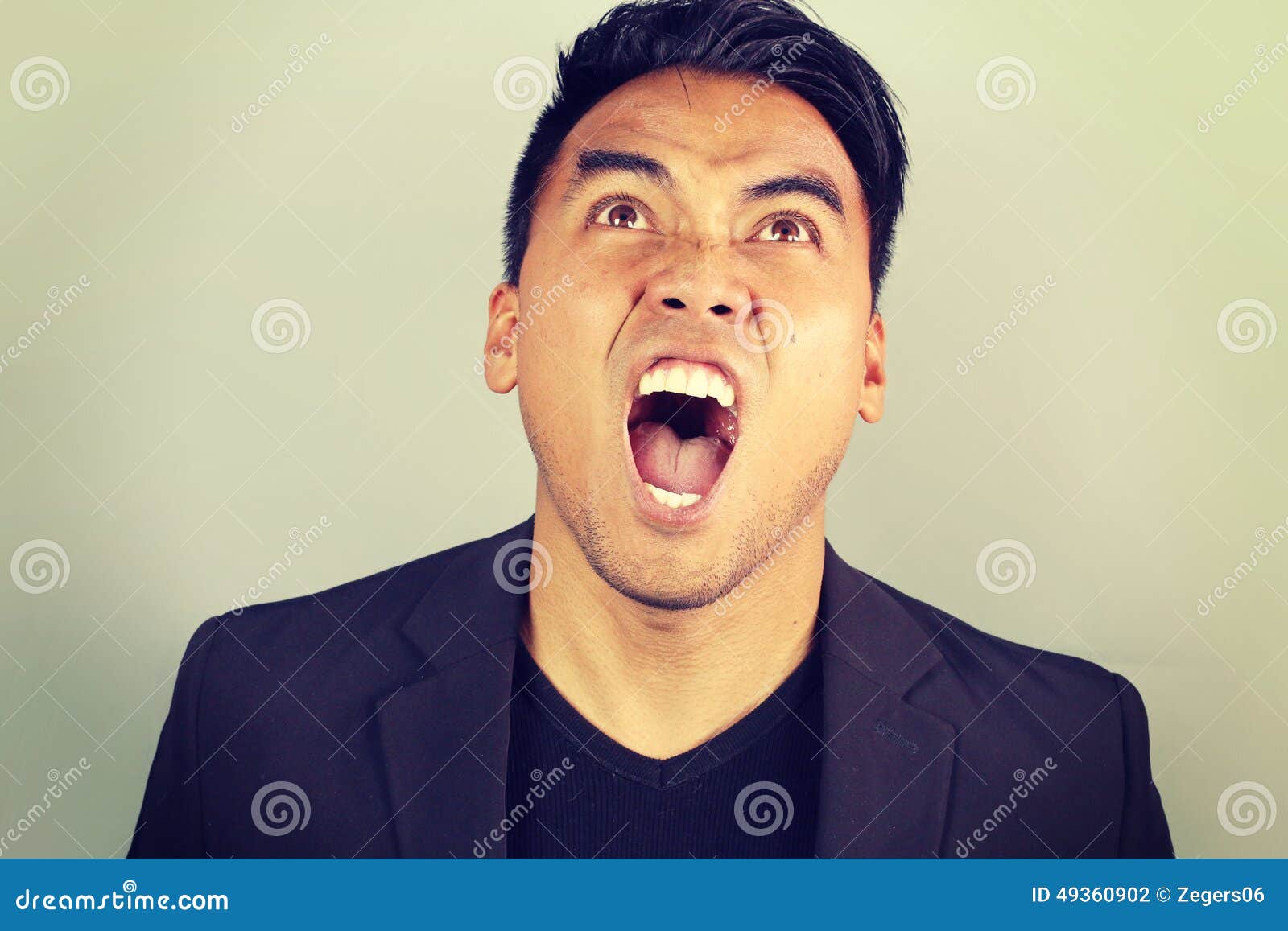 Young Asian man screaming stock photo. Image of pain - 49360902