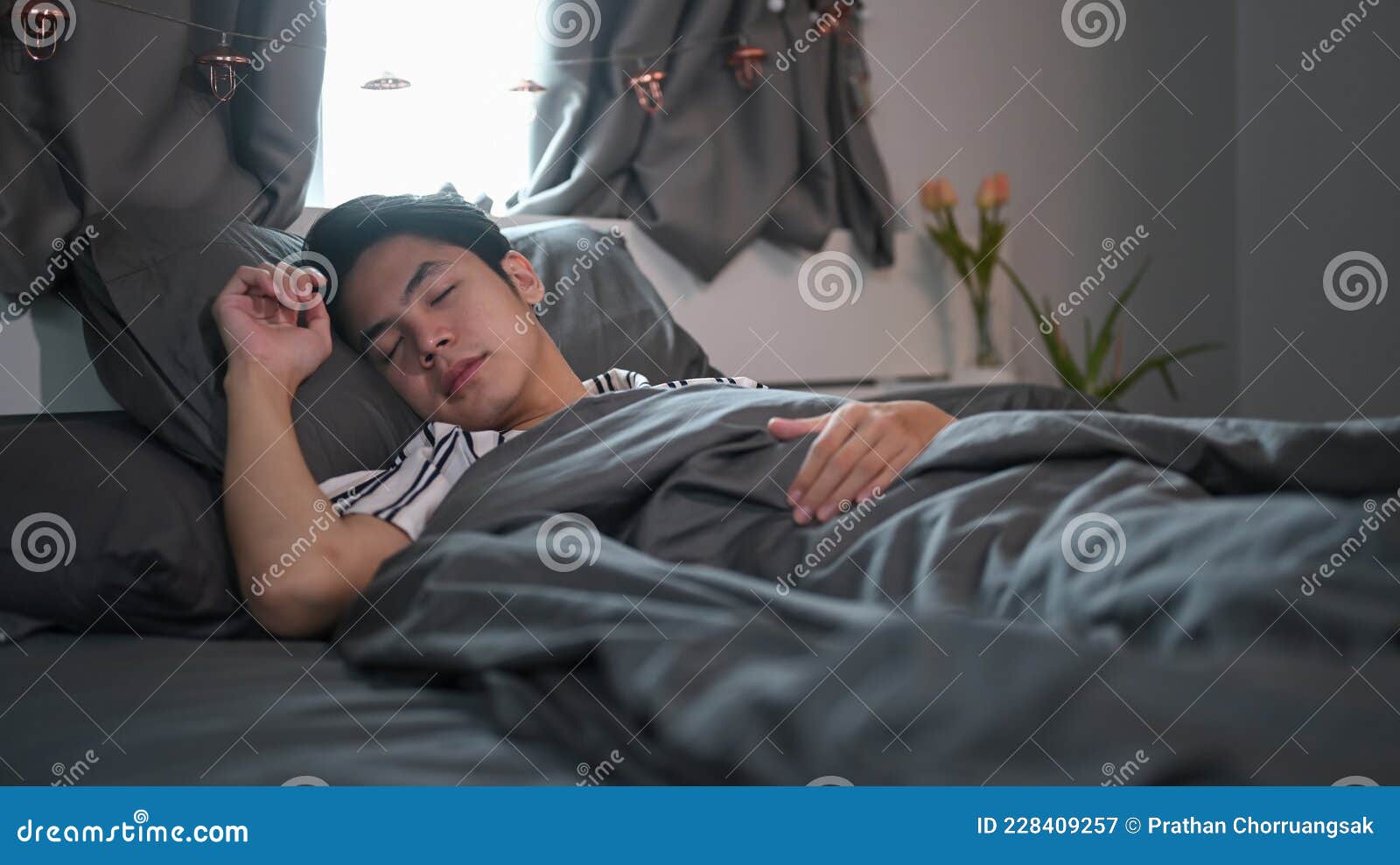 Young Man Sleeping on Comfortable Bed. Stock Image - Image of calm ...