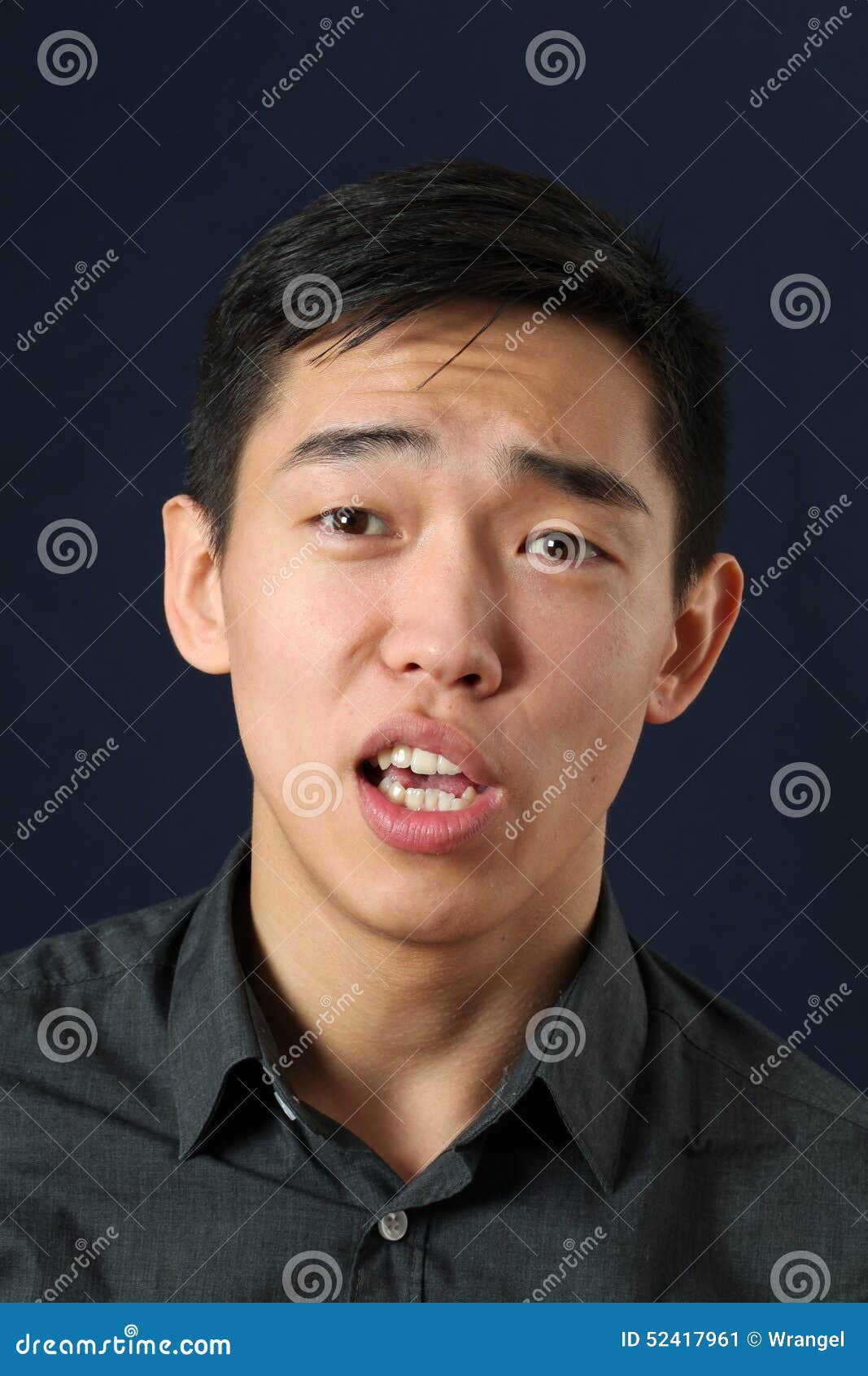 Young Asian Man Speaking and Looking at Camera Stock Image - Image of ...