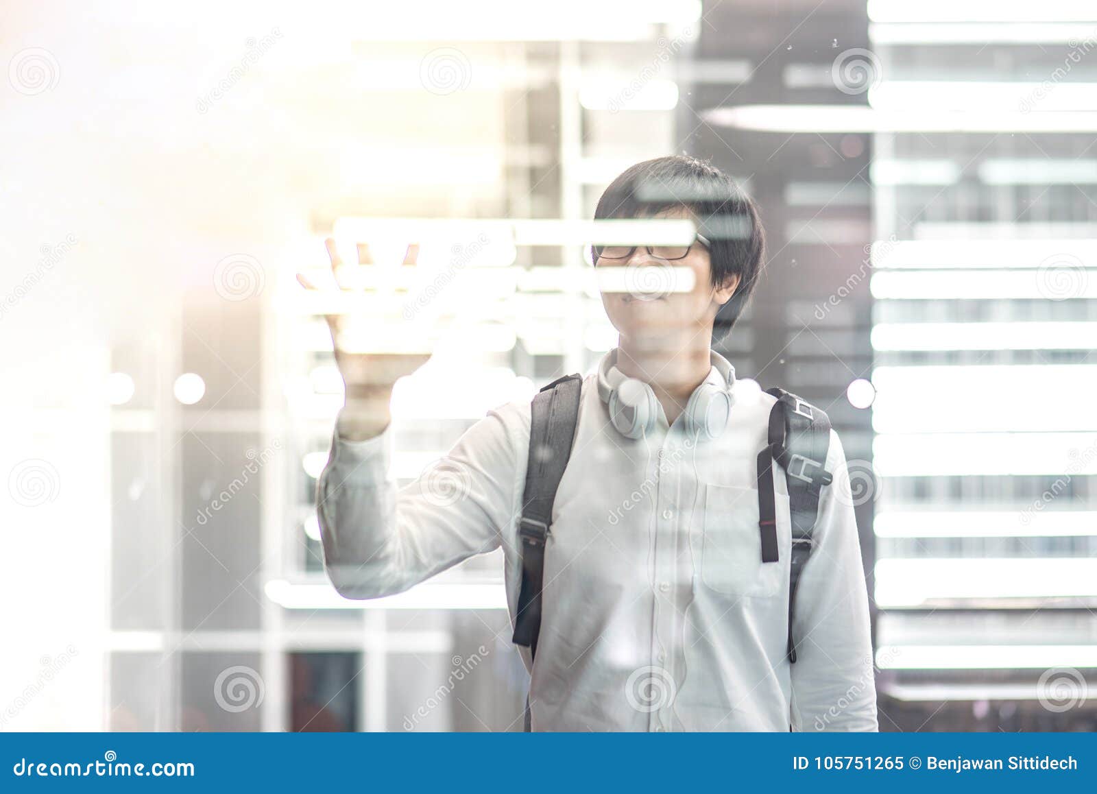 Young Asian Man Student Touching the Glass with Lighting Stripe Stock ...