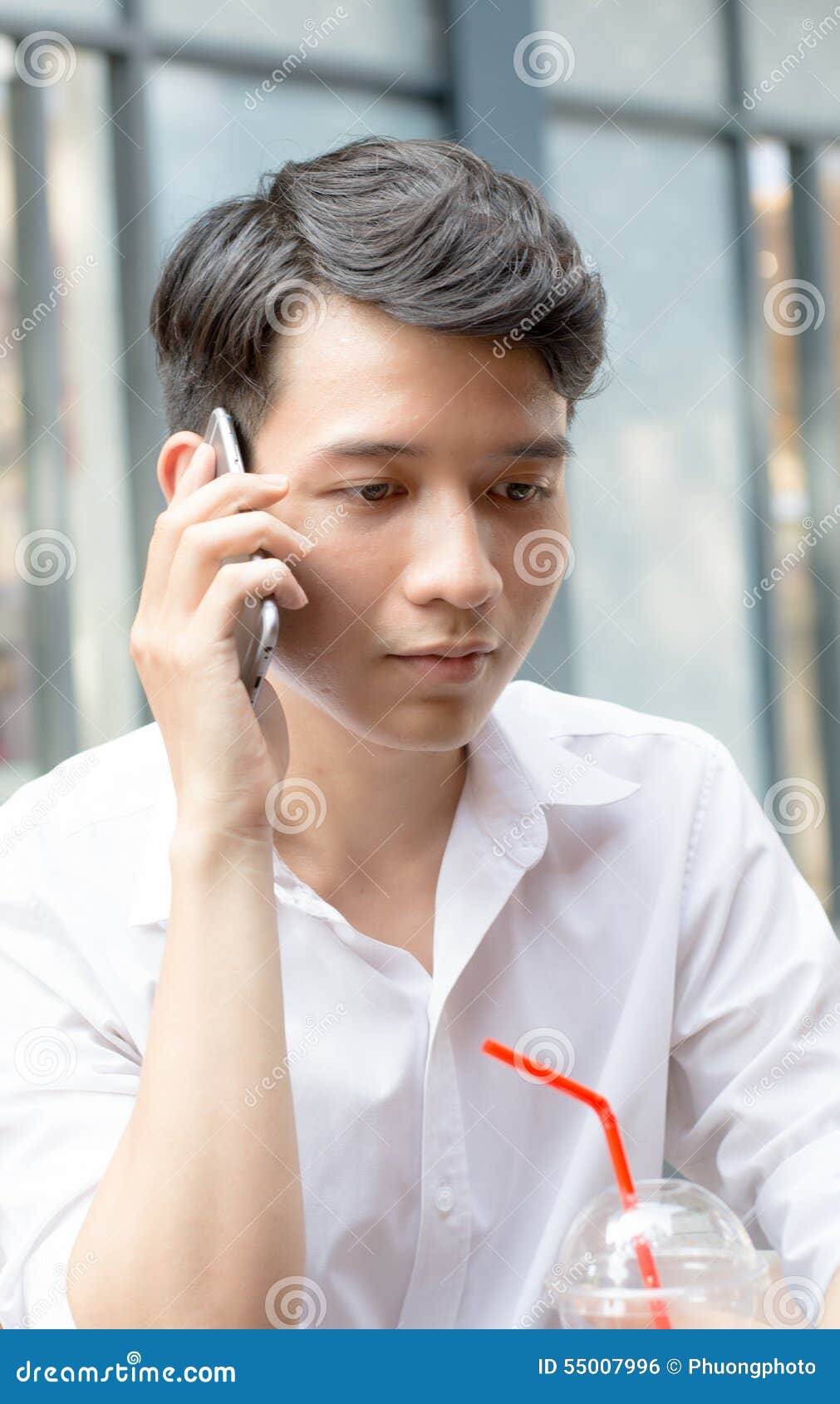 Young Asian Man Talking on the Phone Stock Photo - Image of office ...