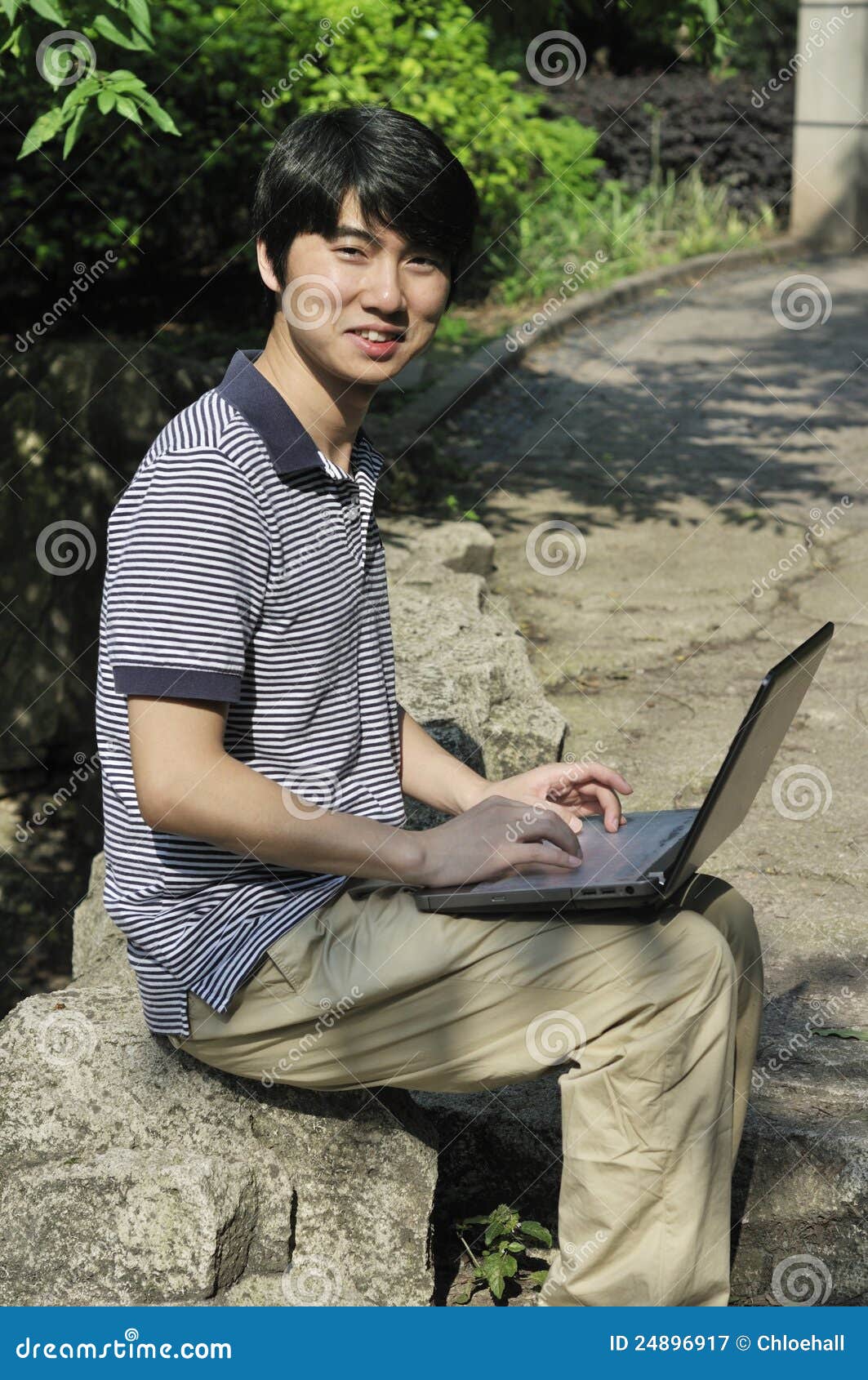 Young Asian Man Using the Laptop Stock Image - Image of laptop, nature ...