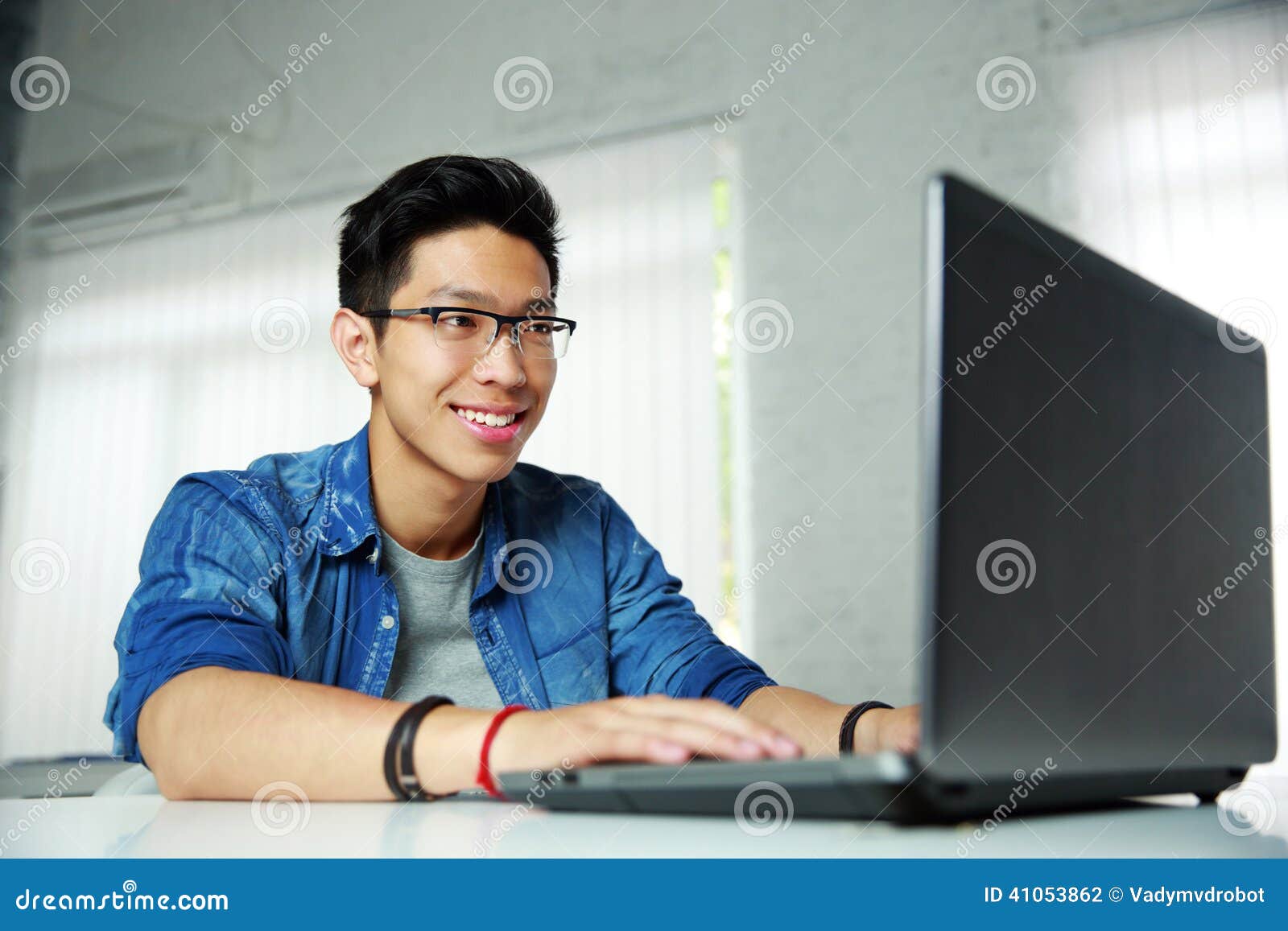 Young Asian Man Working at Office Stock Photo - Image of happiness ...