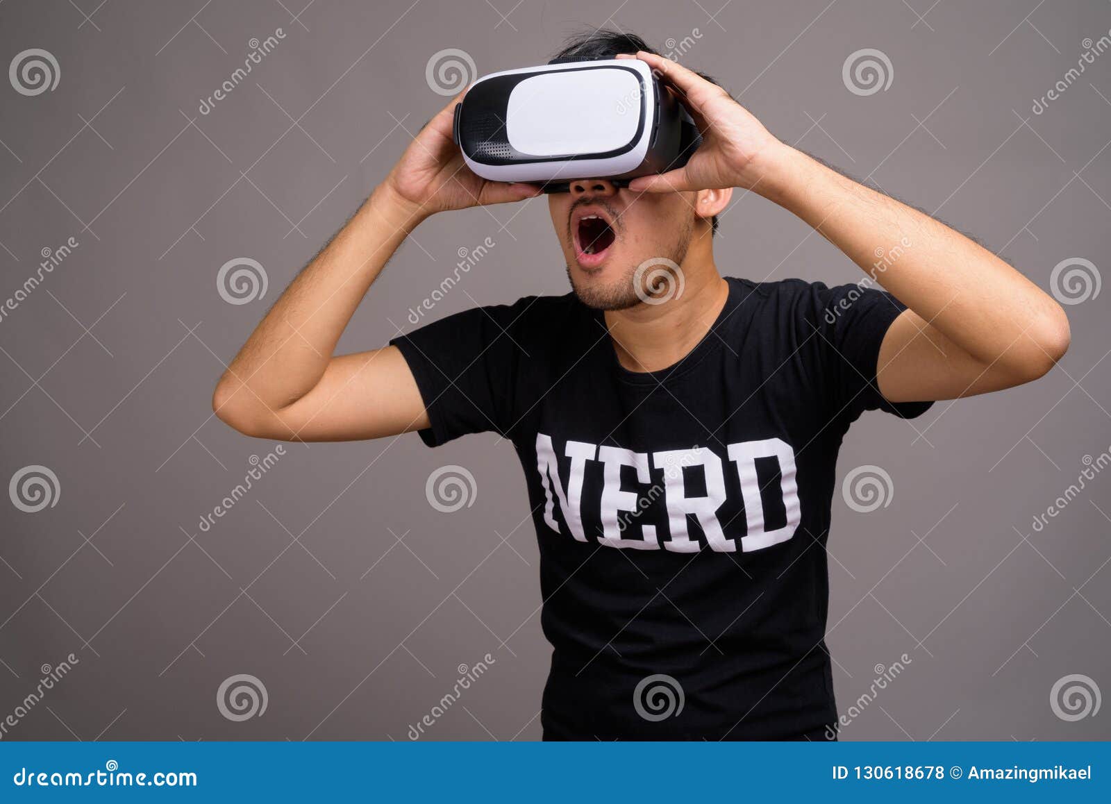 Young Asian Nerd Man Using Virtual Reality Headset Stock Photo - Image ...