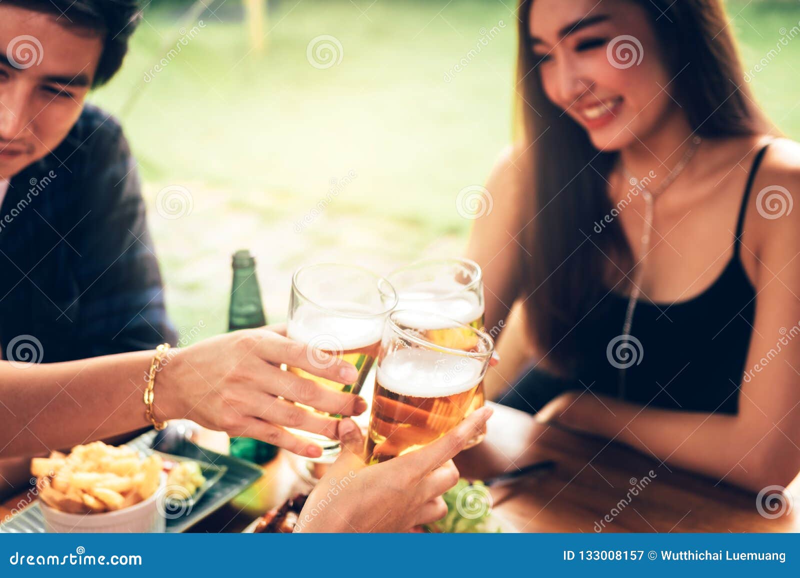 Young Asian People Having Fun at Drinking with Cheering with Bee Stock ...