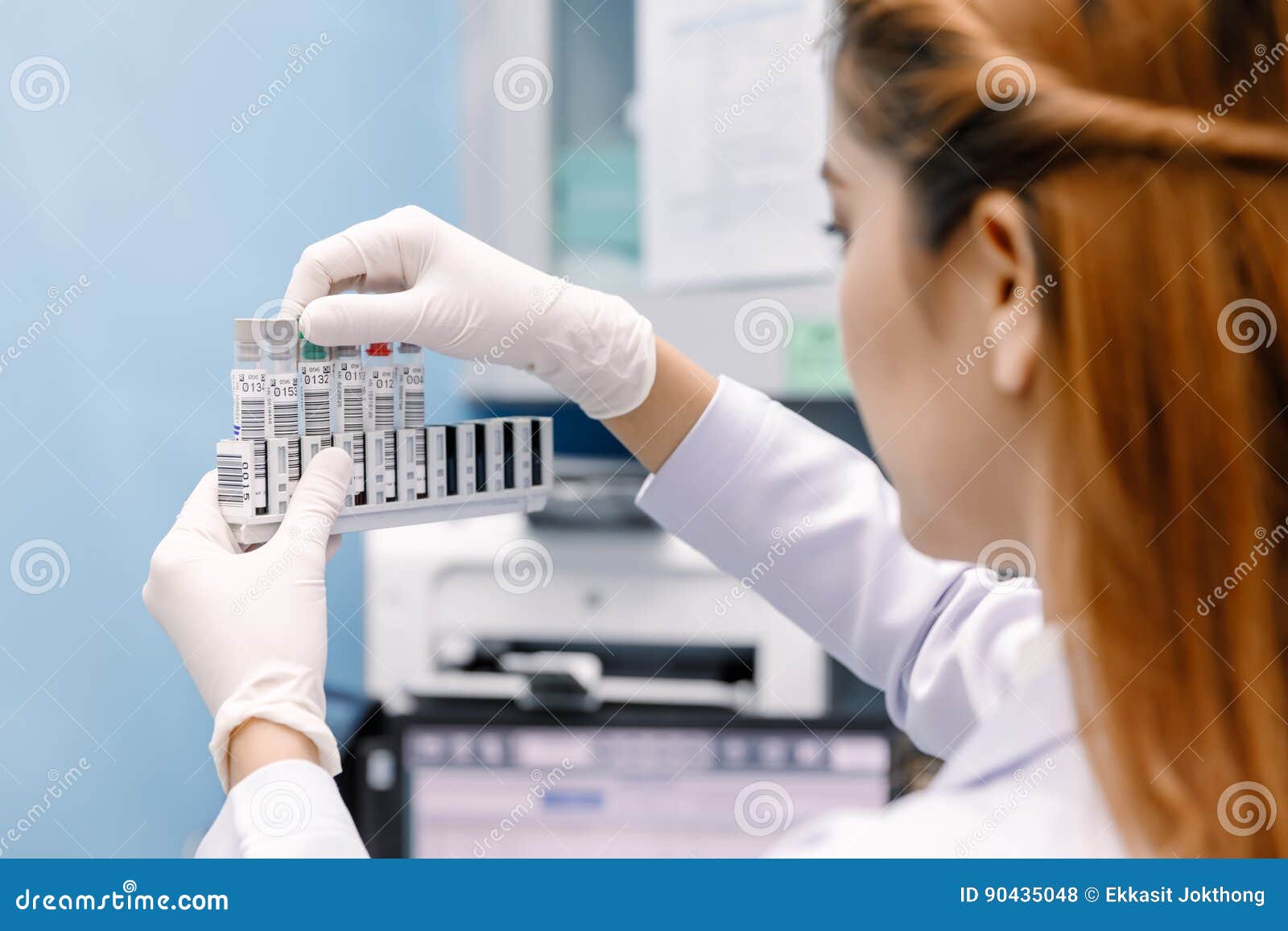 Young Asian Researcher Looking at the Flask in the Science Labor Stock ...