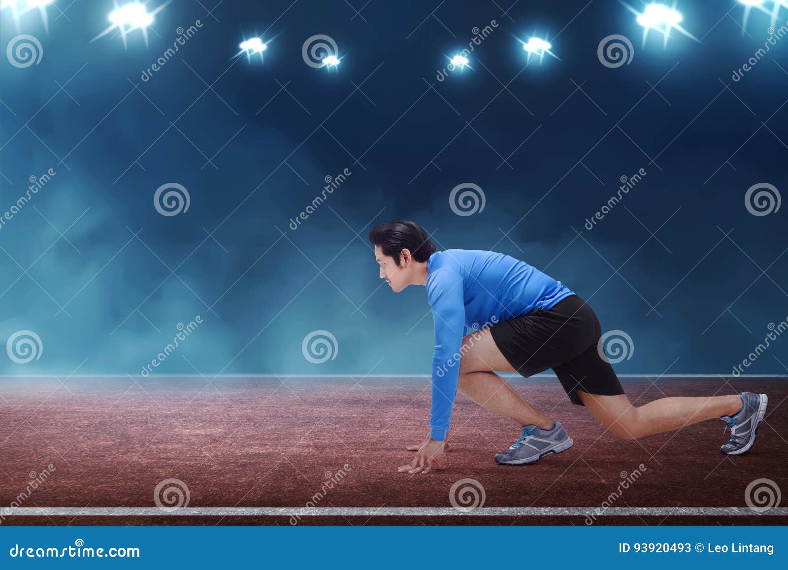 Young Asian Runner Man Kneeling Ready in Start Position Stock Image ...