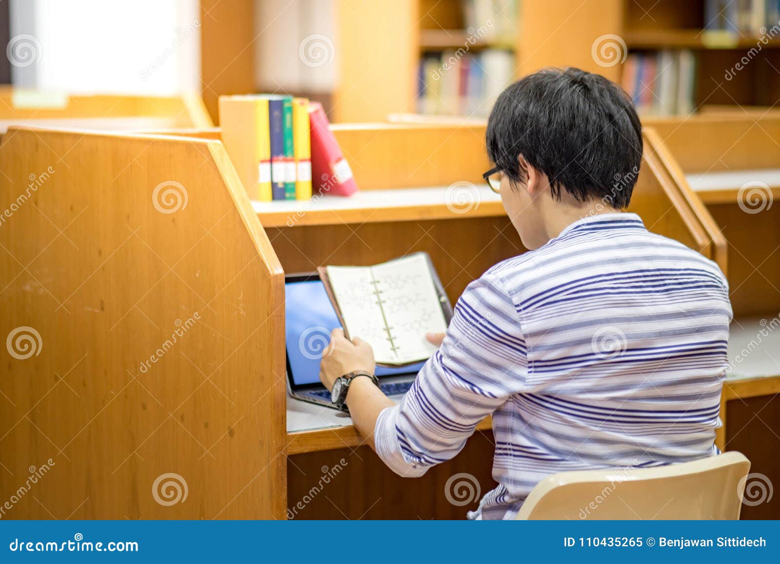 Young Asian University Student Reading Lecture in Library Stock Image ...