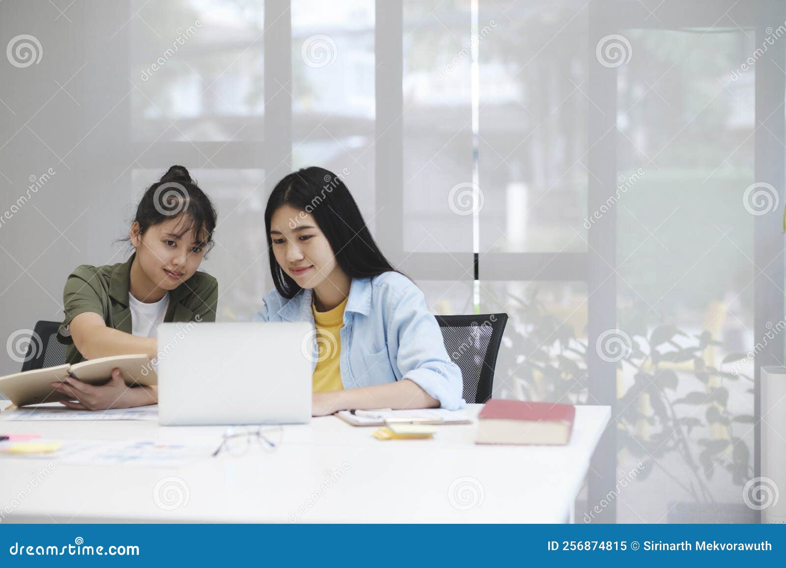 Young Asian University Students Studying Learning Discuss Working on ... Young Asian University Students Studying Learning Discuss Working on ...