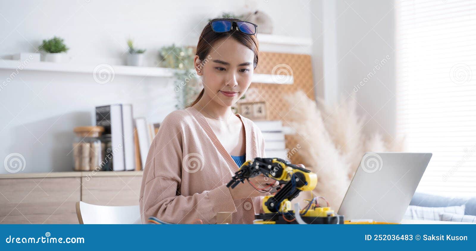 Young Asian Woman Engineer Programer Working on Robotics Project at ...
