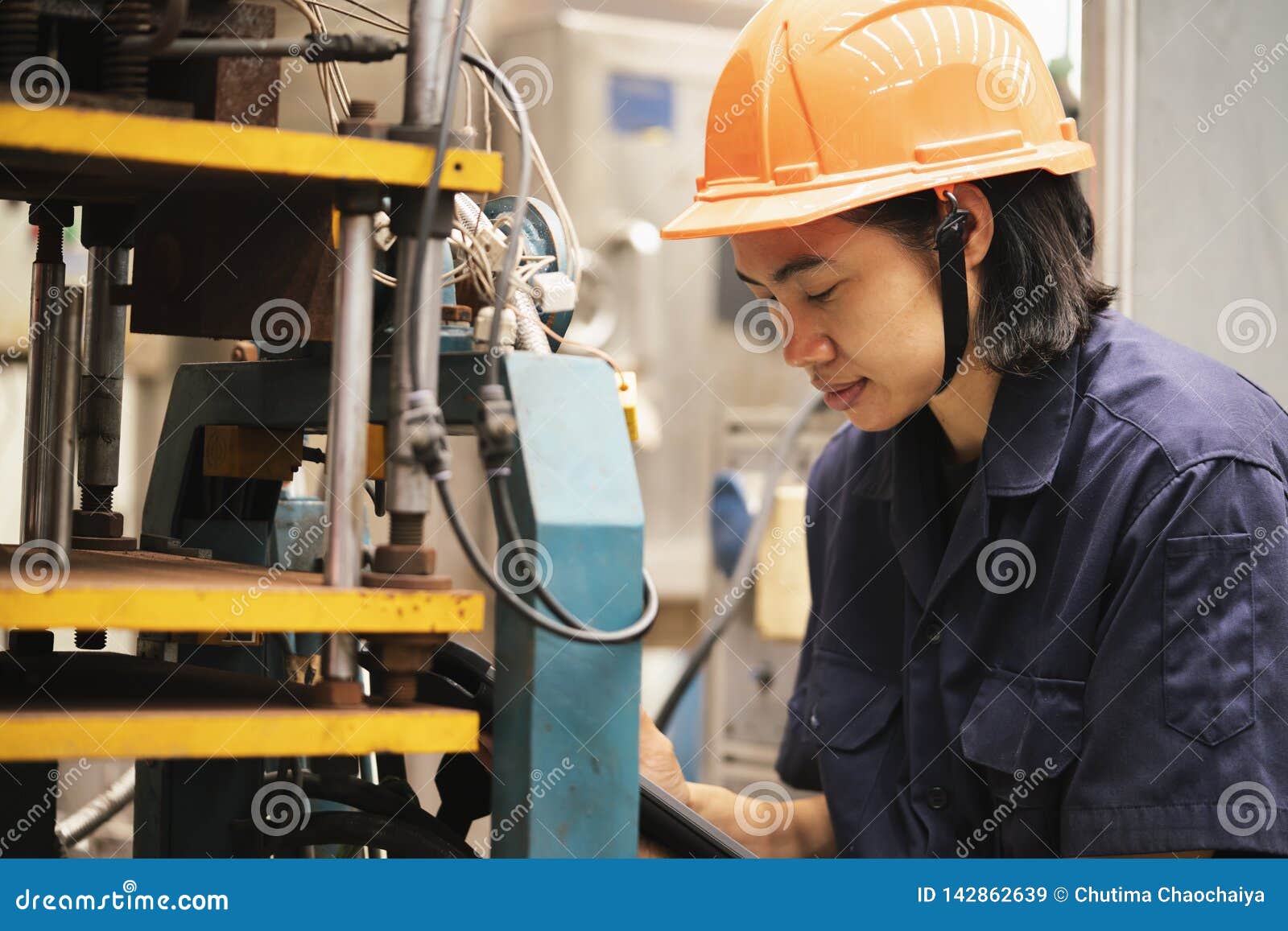 Young Asian Woman Engineer Set Up and Testing Machine in the Laboratory ... Young Asian Woman Engineer Set Up and Testing Machine in the Laboratory ...