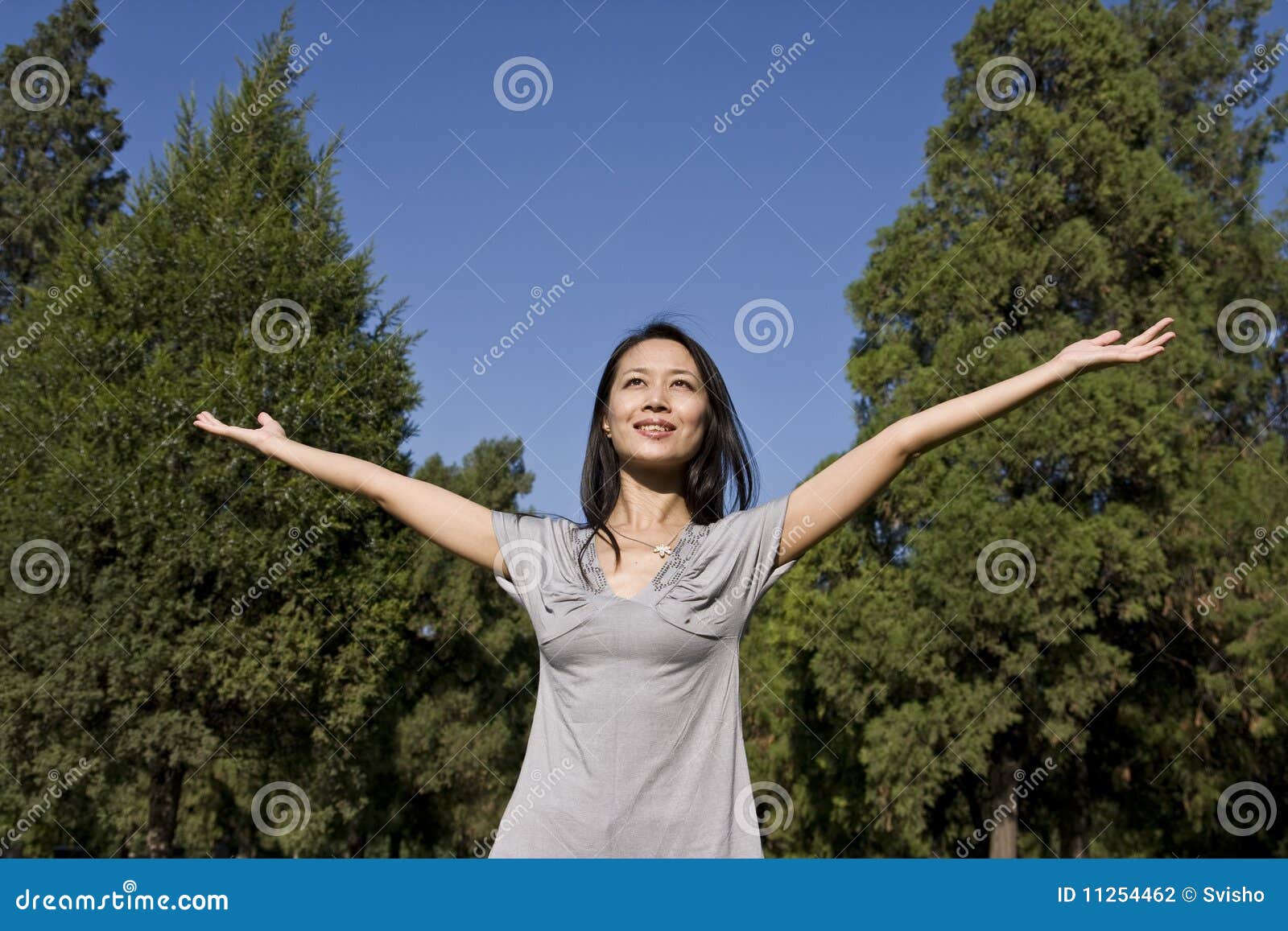 Young Asian Woman Enjoying the Sunlight Stock Photo - Image of hair ...