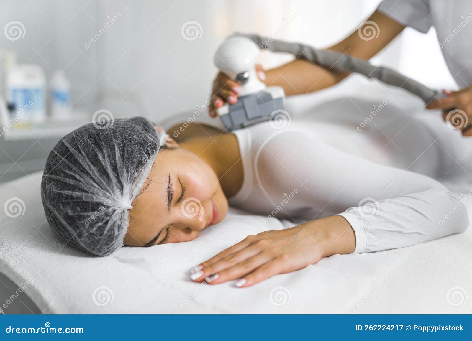Young Asian Woman Having Procedure Of Anti Cellulite Lpg Massagein A