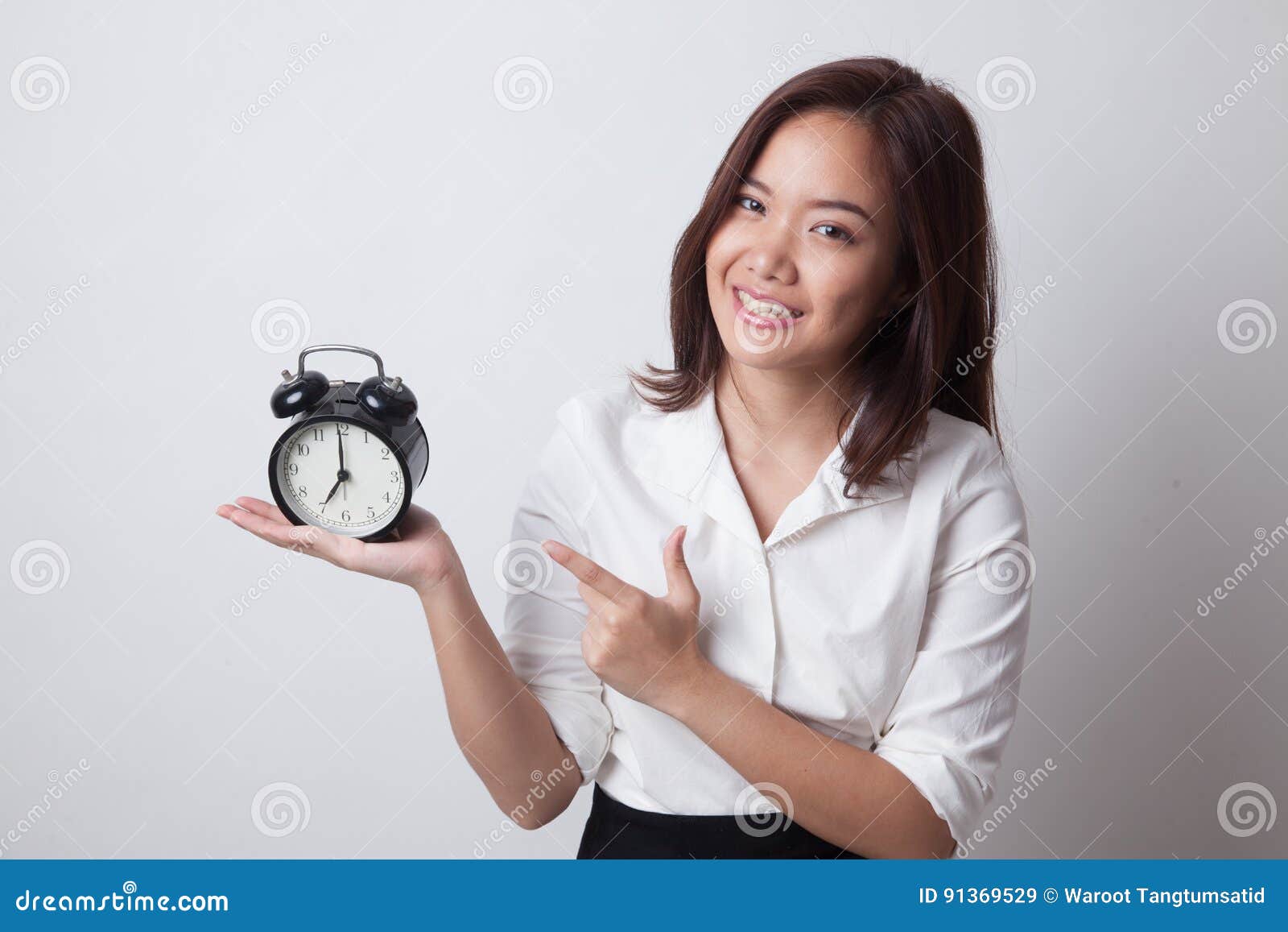 Young Asian Woman Point To a Clock. Stock Image - Image of appointment ...