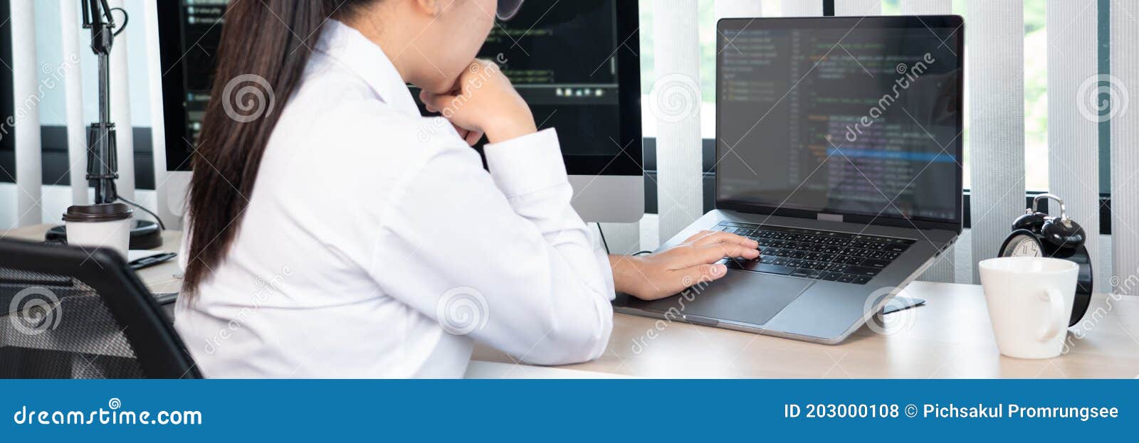 Young Asian Woman Programmer Typing Code Working with Computer at Table ... Young Asian Woman Programmer Typing Code Working with Computer at Table ...