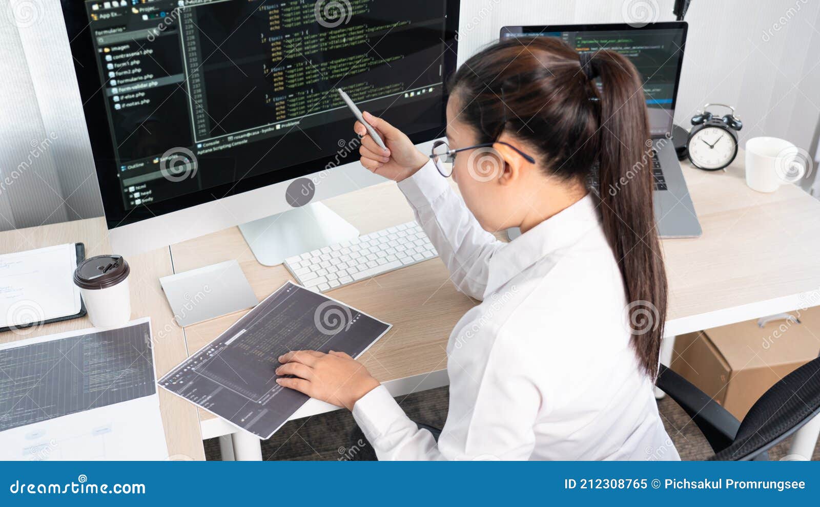 Young Asian Woman Programmer Typing Code Working With Computer At Table ... Young Asian Woman Programmer Typing Code Working With Computer At Table ...