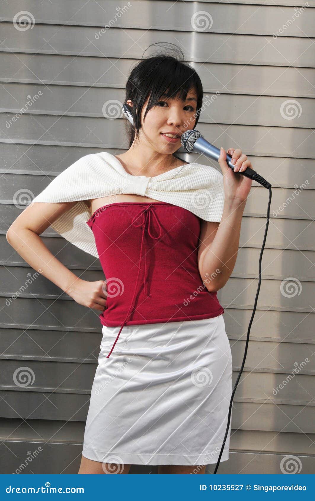Young Asian Woman Singing stock image. Image of korea - 10235527