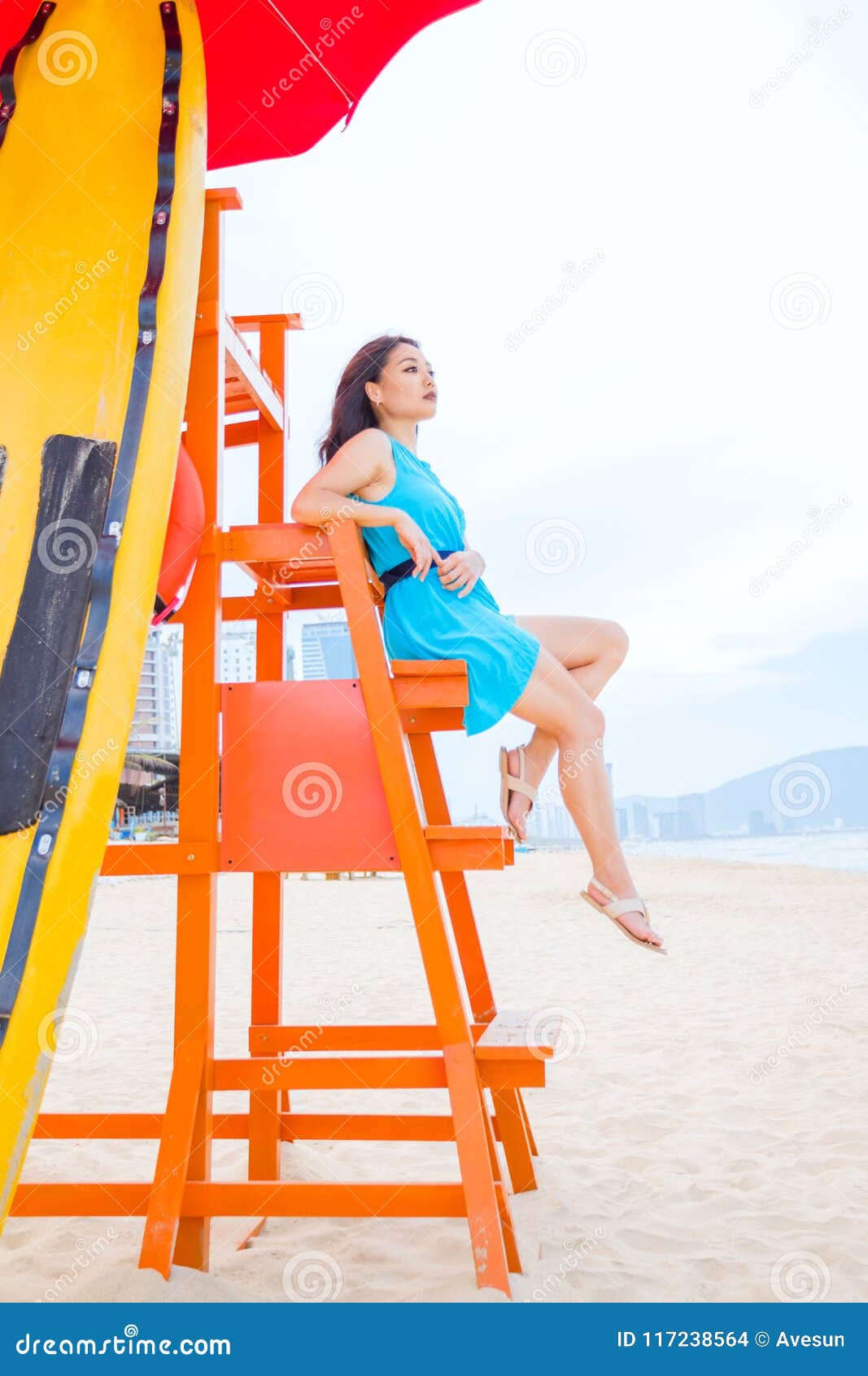 Young Asian Woman Sitting on Lifeguard Tower Stock Photo - Image of ...