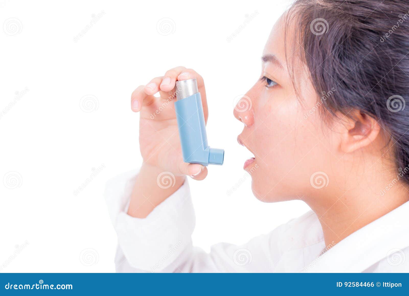 Young Asian Woman Using Inhaler during Asthmatic Attack Stock Photo ...