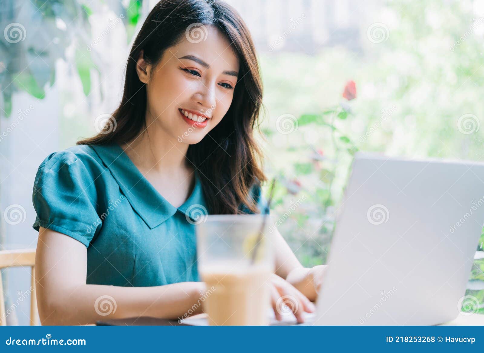 Young Asian Woman Using Laptop at Coffee Shop Stock Photo - Image of ...