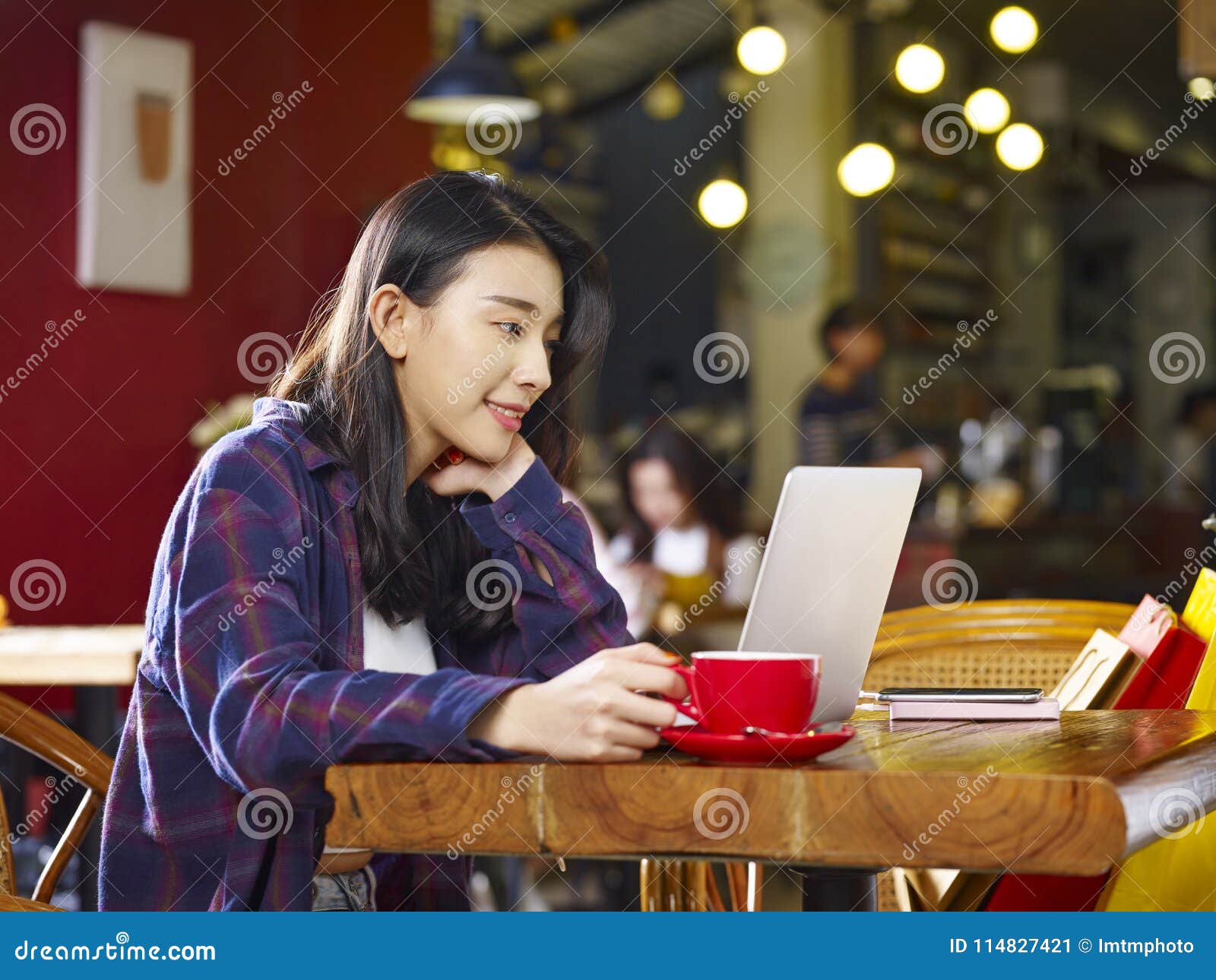 Young Asian Woman Using Laptop in Coffee Shop Stock Image - Image of ...