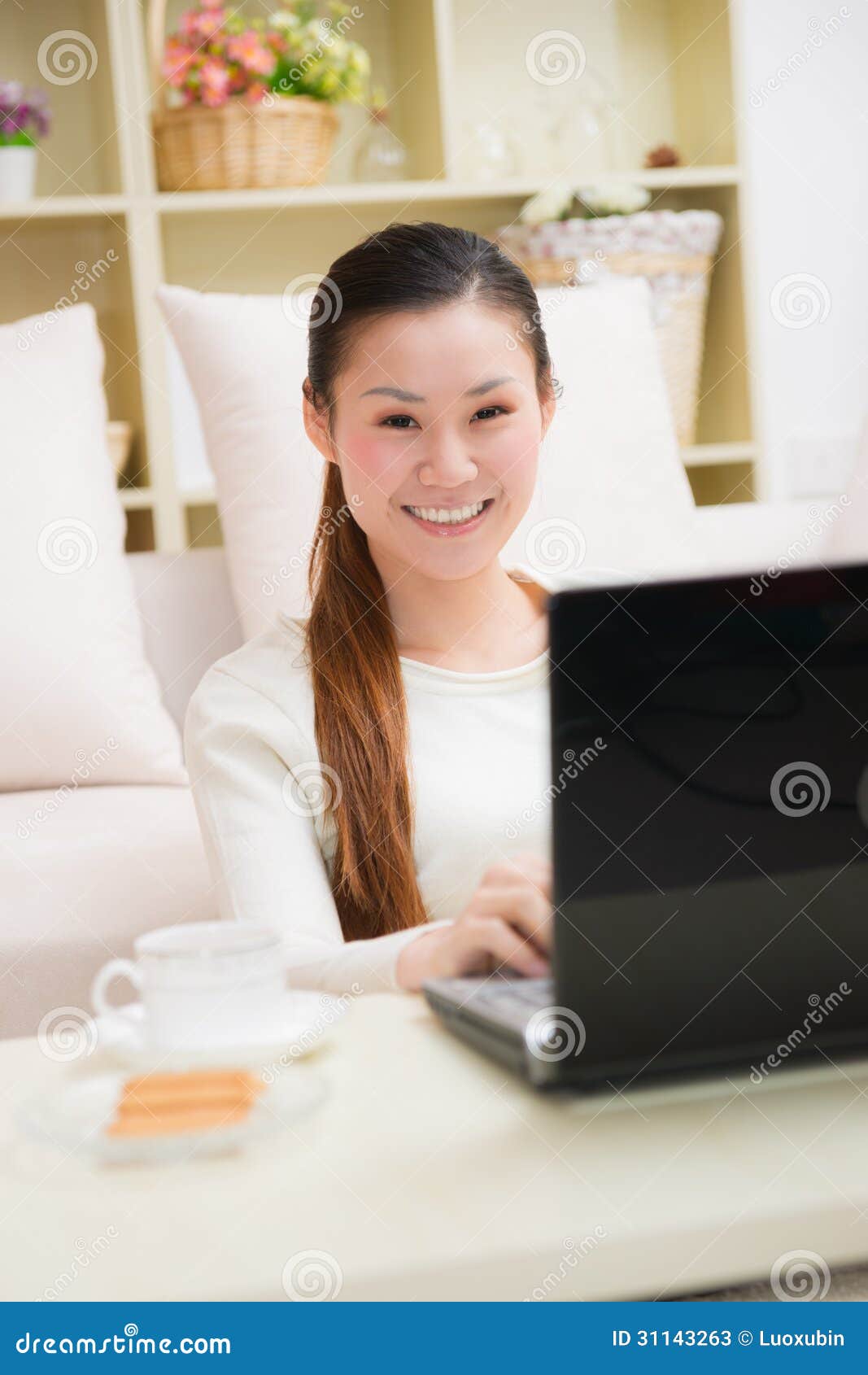 Young Asian Woman Using a Laptop Stock Image - Image of interior ...