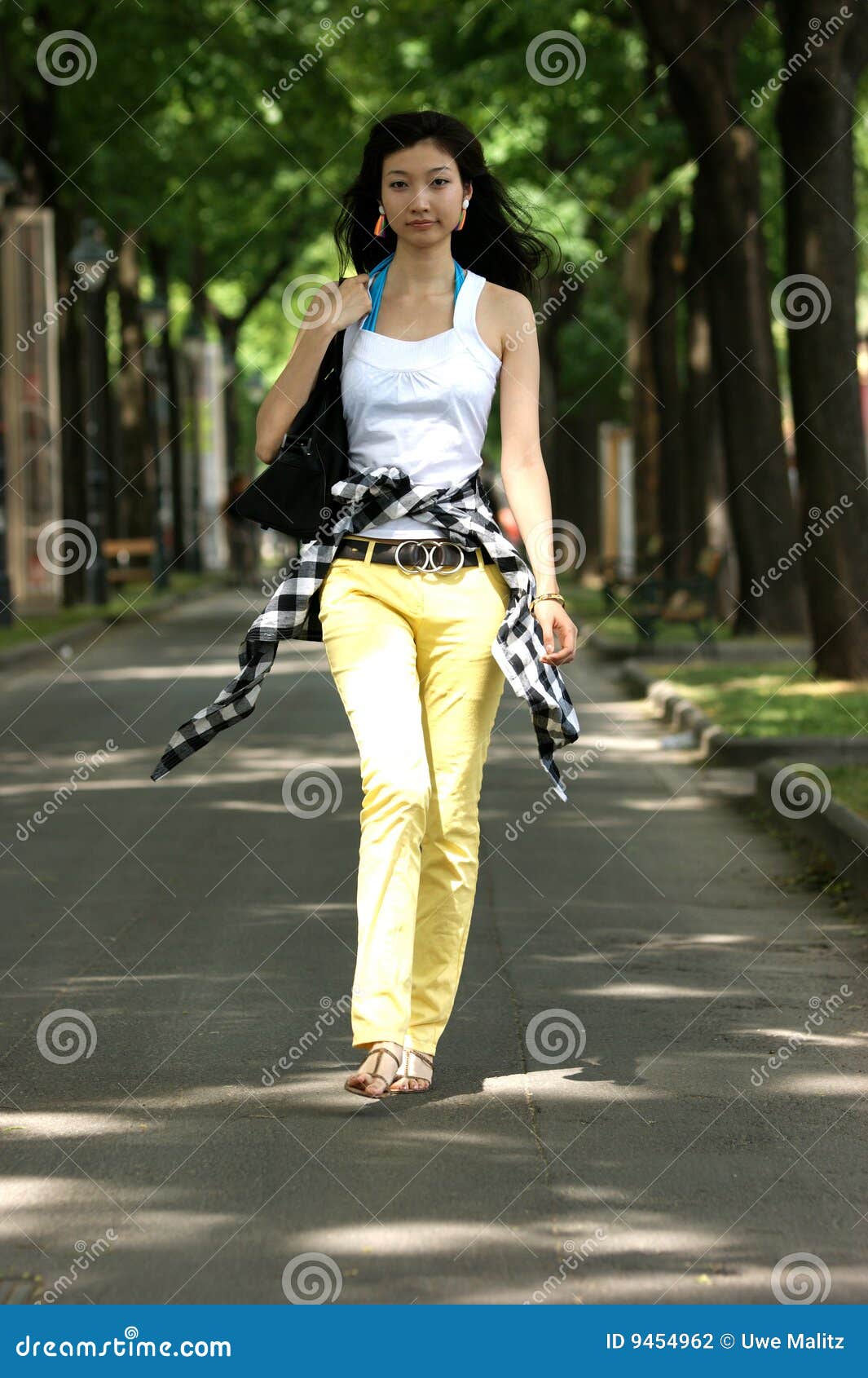 Young Asian woman walking. stock photo. Image of walk - 9454962