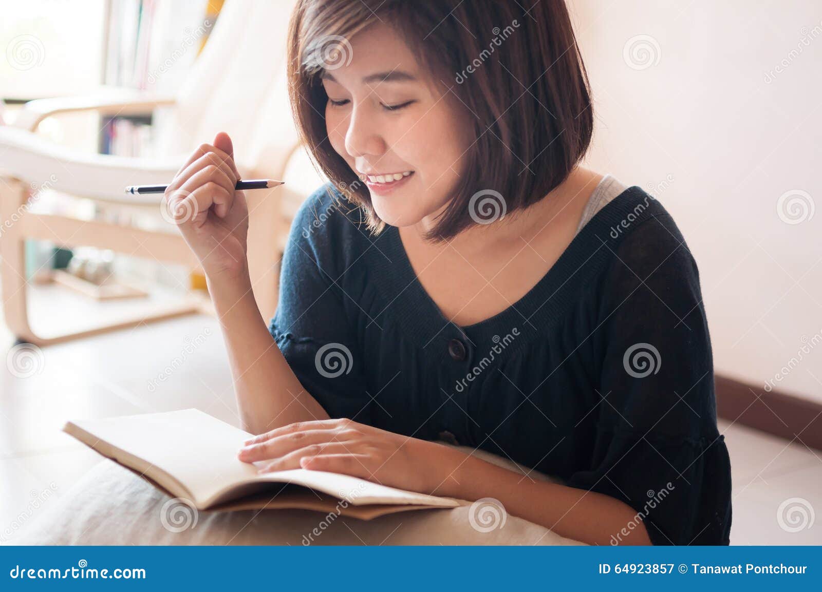 Young asian woman writing. stock image. Image of drawing - 64923857