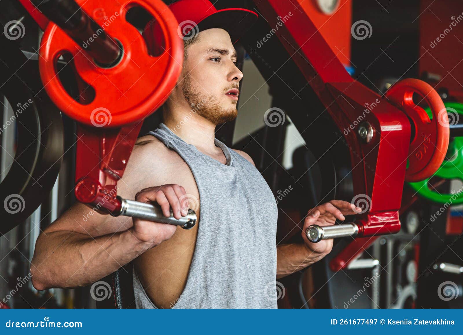 The Young Athlete Does Exercises in the Gym. Power Approaches on the ...