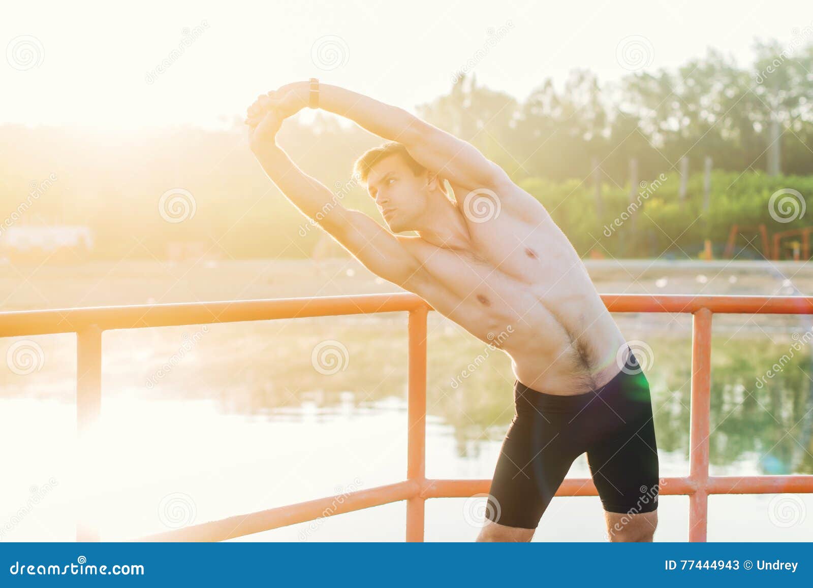 Young Athlete Man Doing Side Bend Exercise. Stock Image - Image of ...