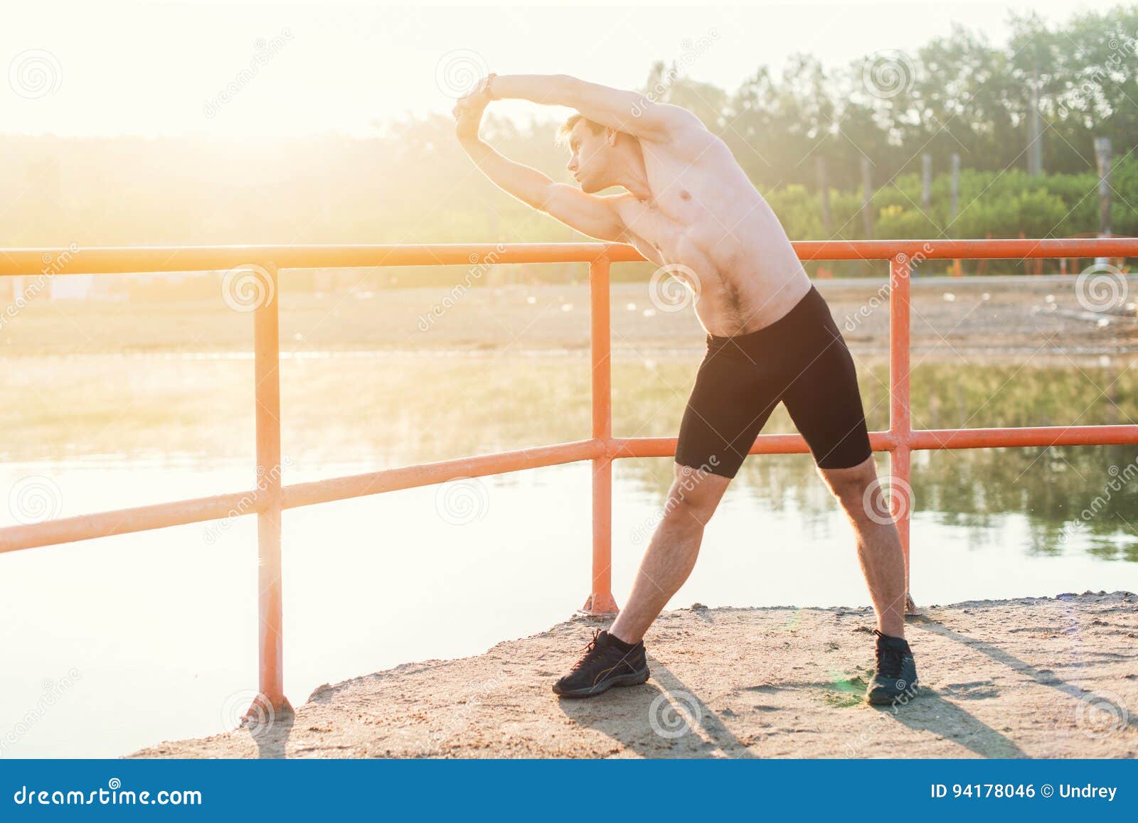 Young Athlete Man Doing Side Bend Exercise. Stock Photo - Image of ...
