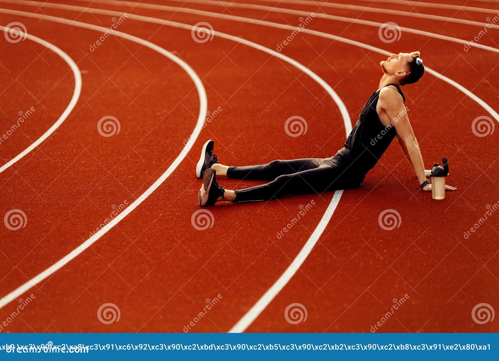 Young Athlete Resting after Running in the Stadium Stock Image - Image ...