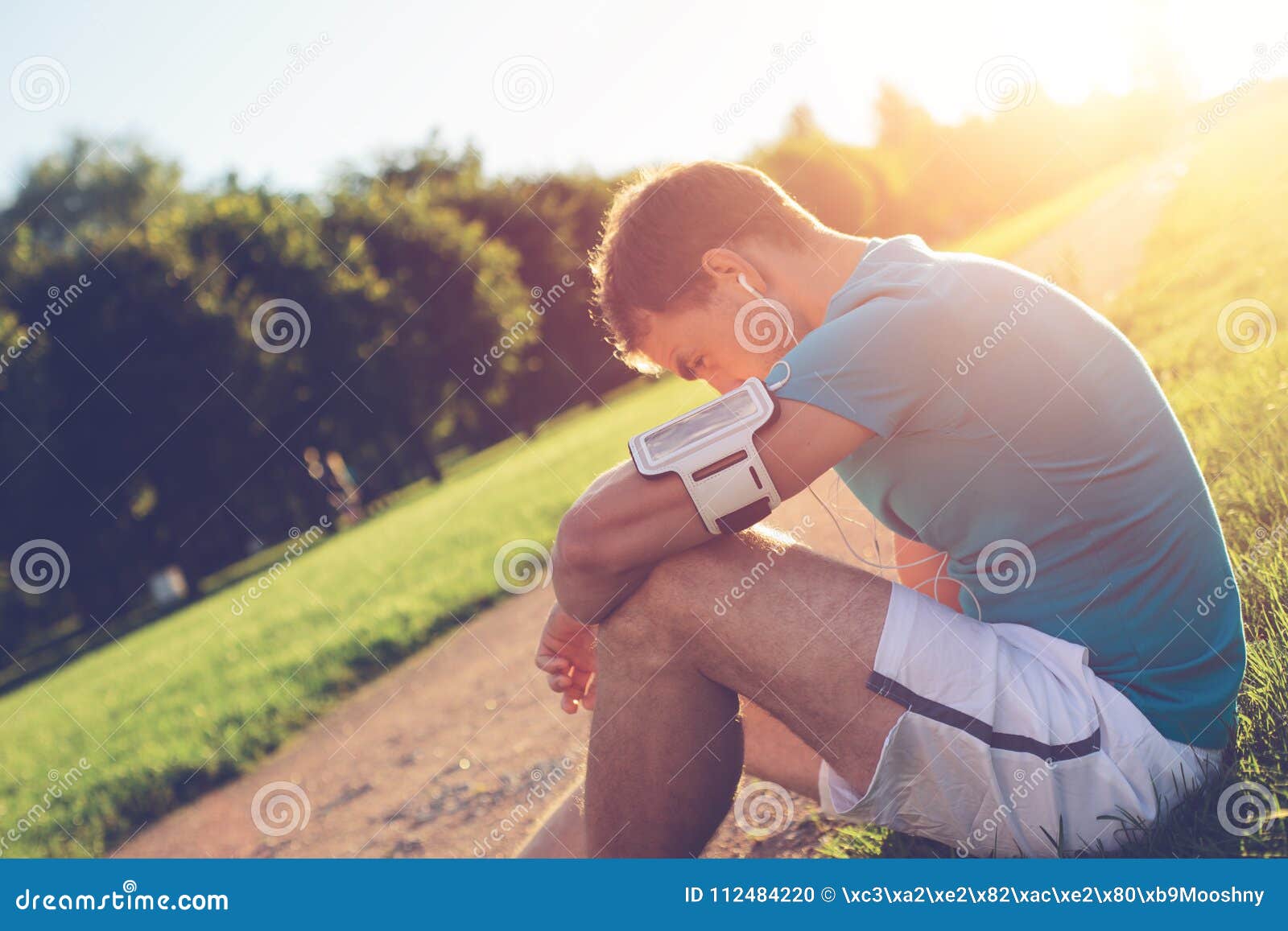 Young Athlete Resting after Workout in the Park Stock Photo - Image of ...
