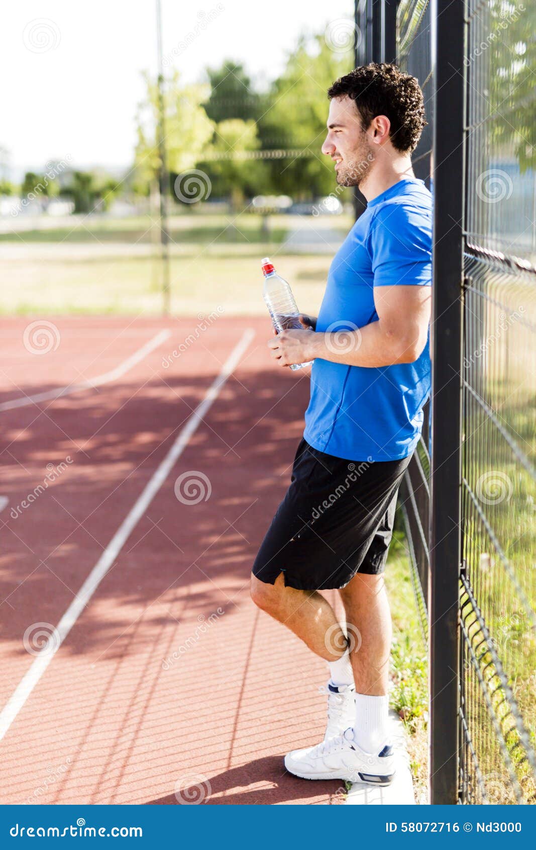 Young Athlete Taking a Break on a Hot Summer Day Stock Photo - Image of ...